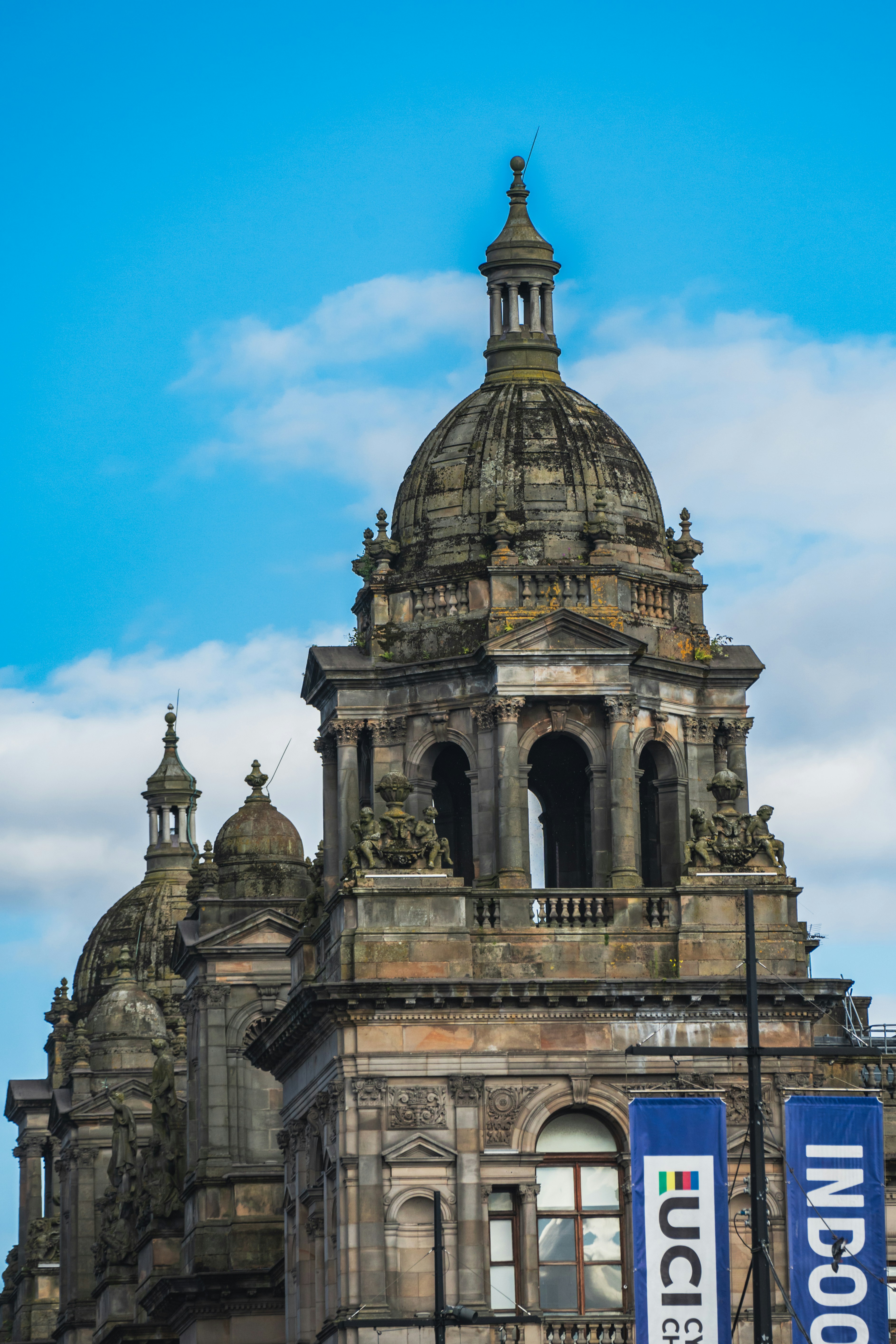 Weathered City Hall Dome Reaching Toward a Clear Azure Sky