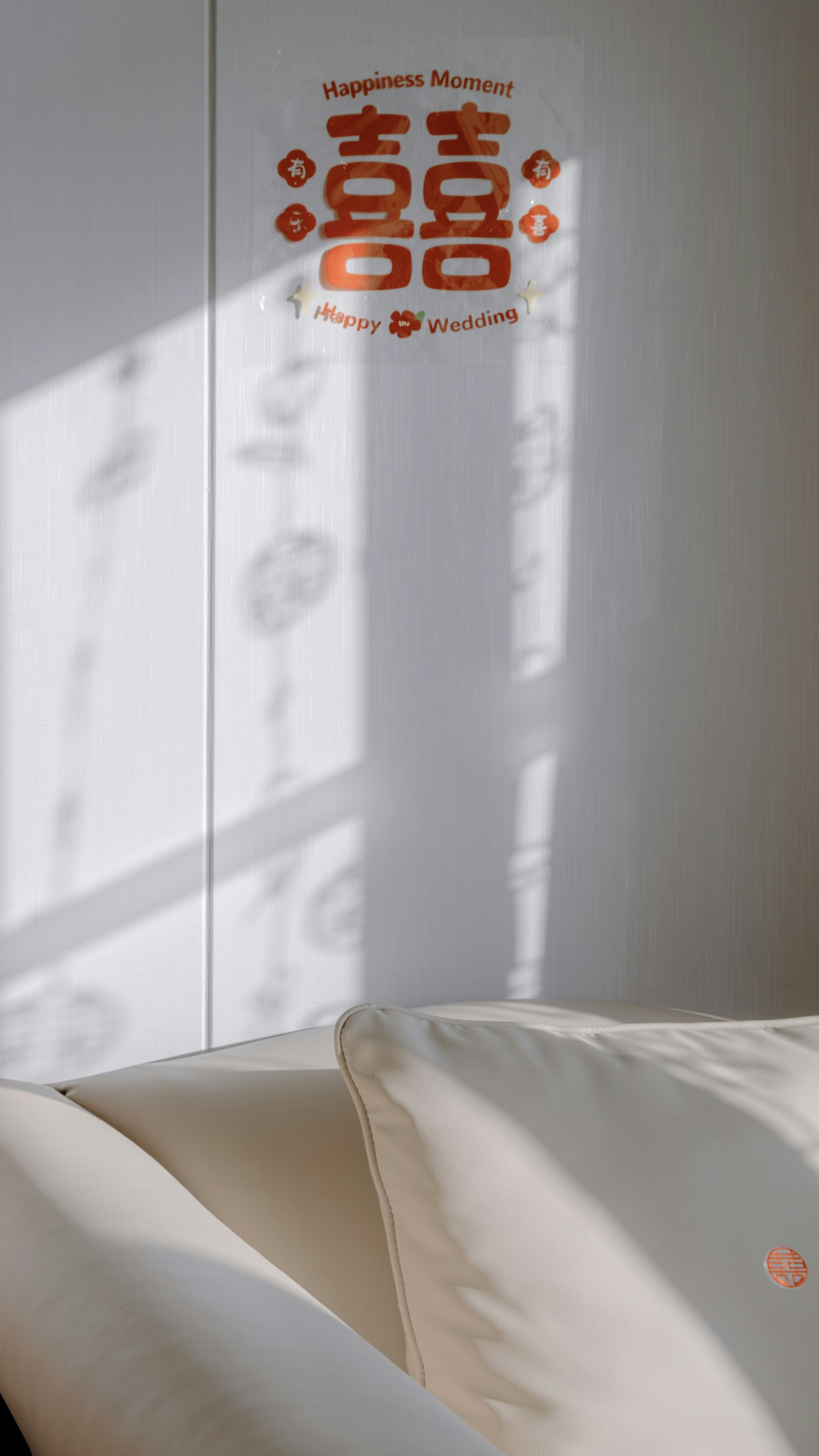 Red Double Happiness Banner Casting Shadows Across a Calm Bedroom