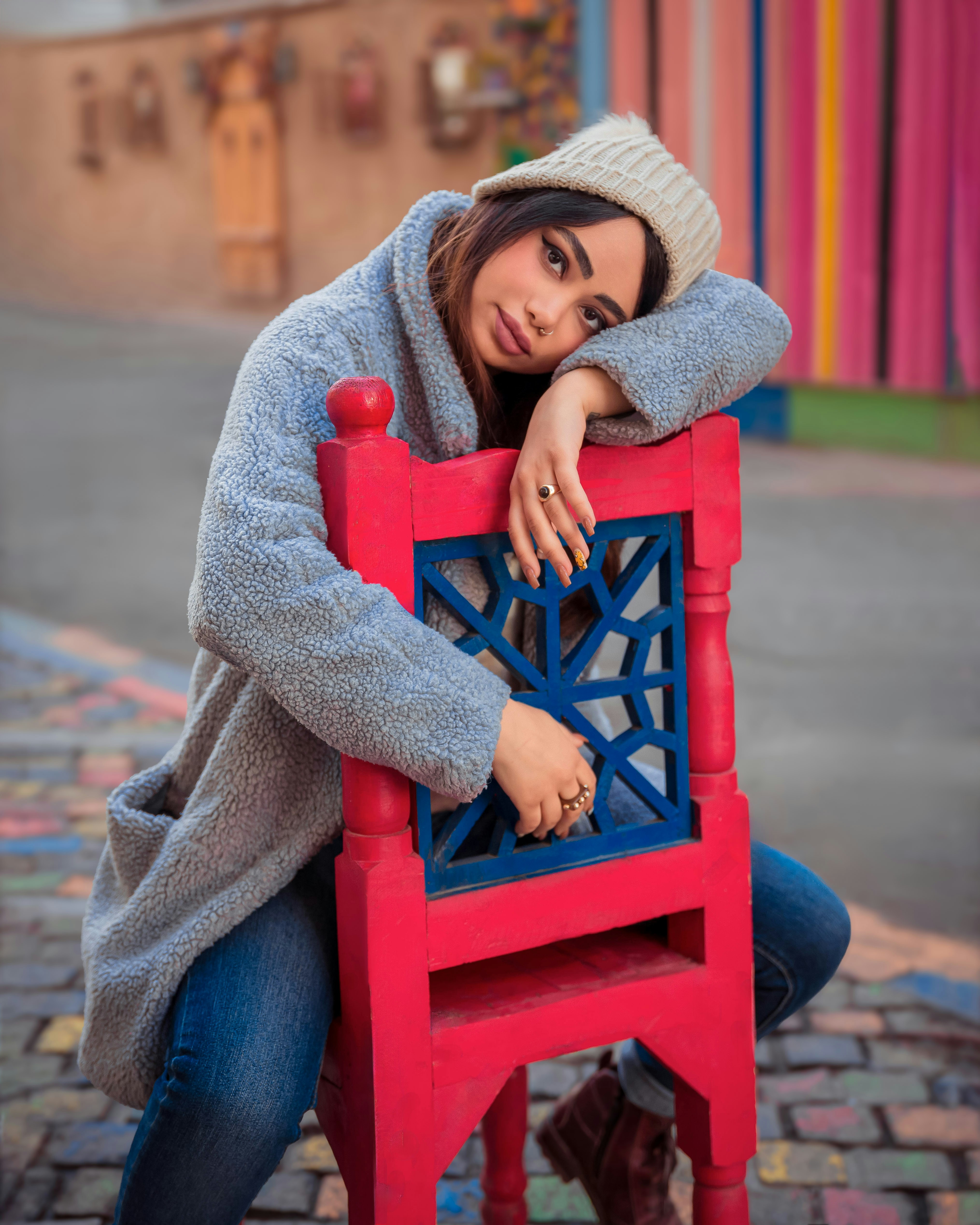 Cozy Confidence on a Colorful Street Chair