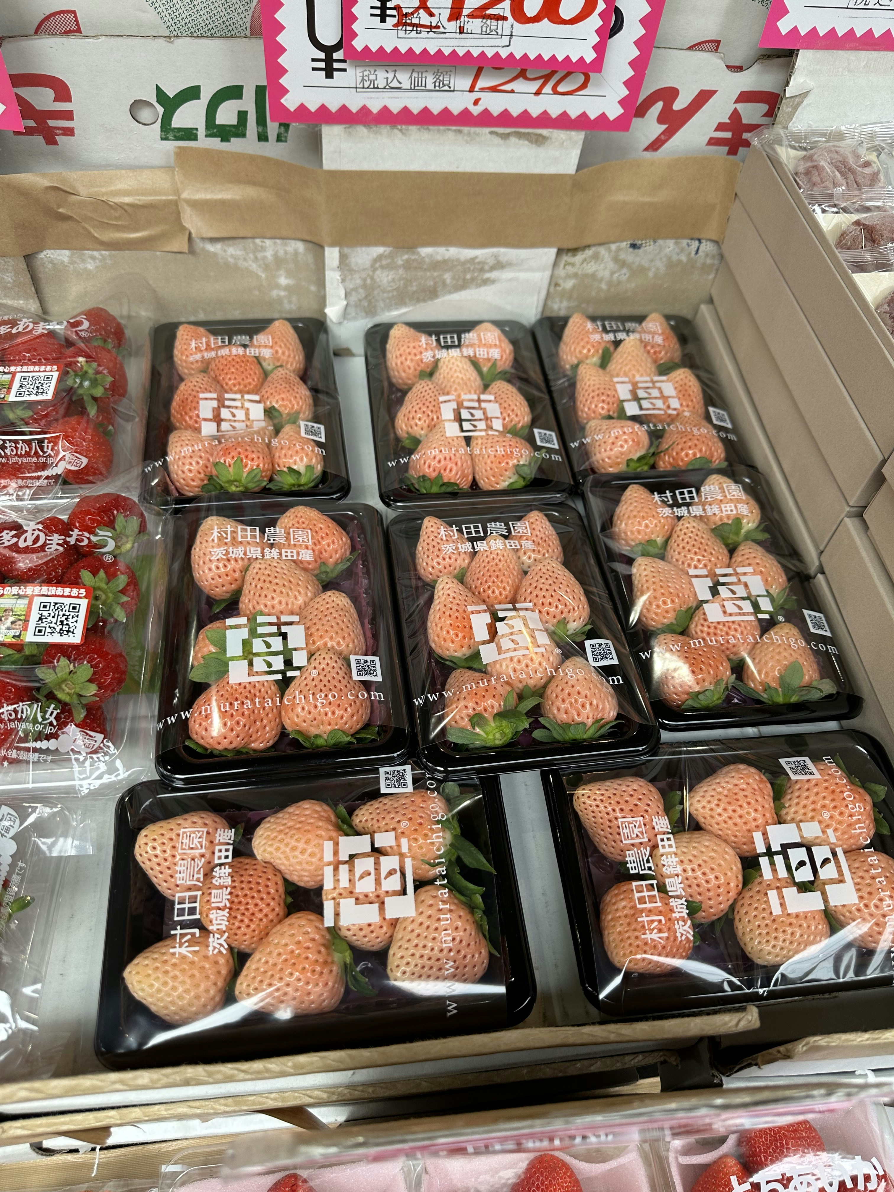 A display case filled with lots of fresh strawberries photo – Free Food ...