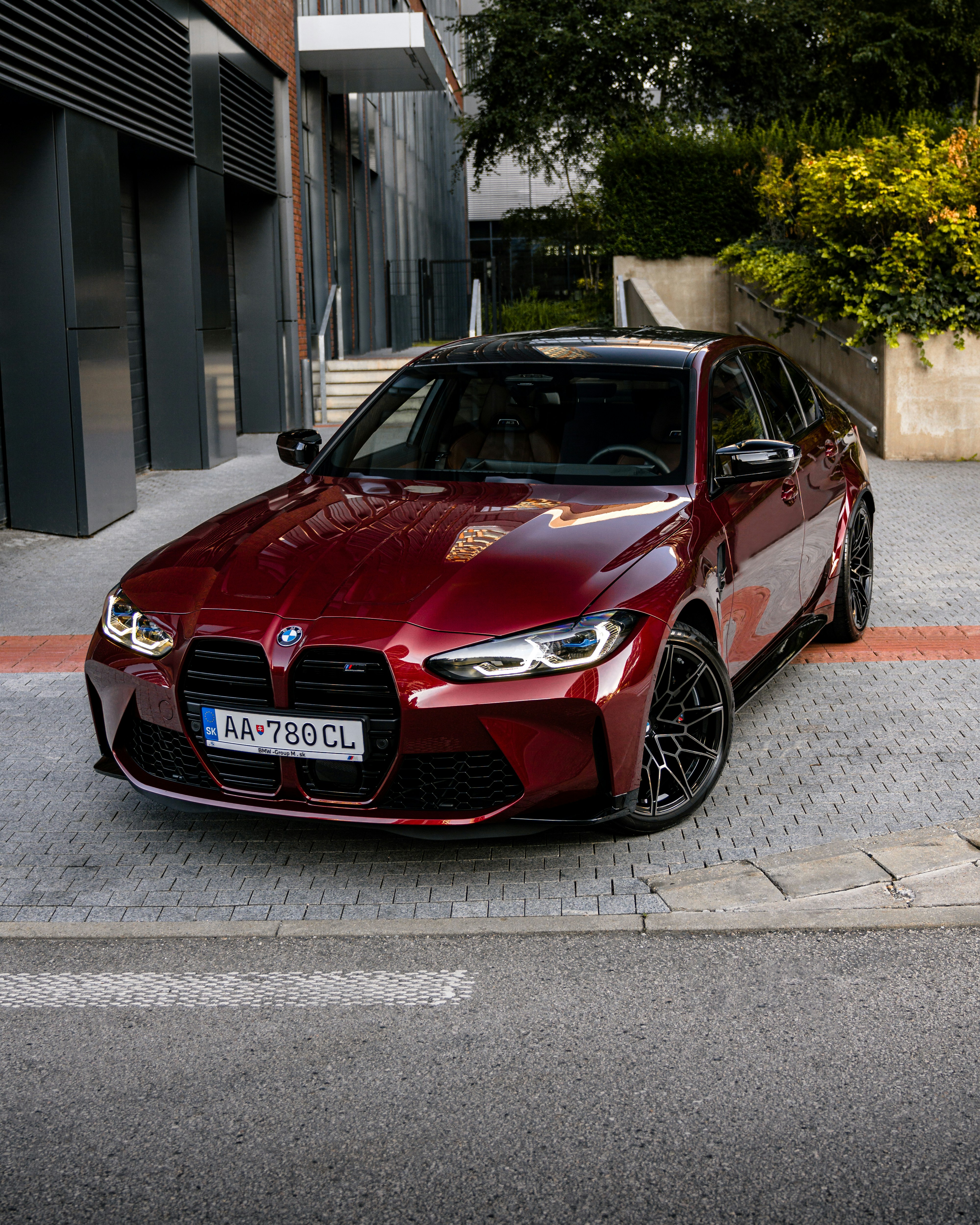 Crimson Shift: A BMW Cornered by Urban Geometry