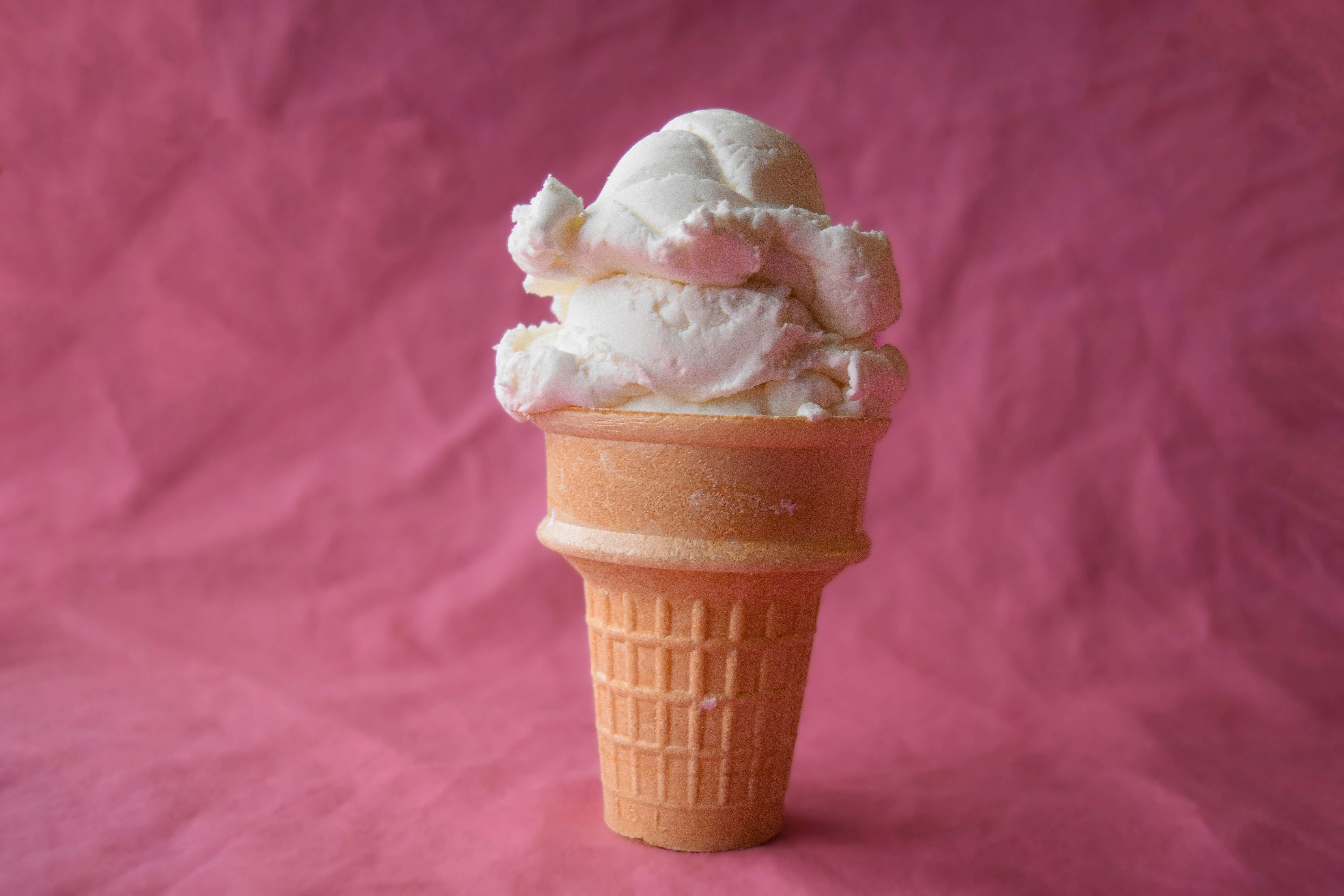 A cone of ice cream on a pink background photo – Free Ice cream Image ...