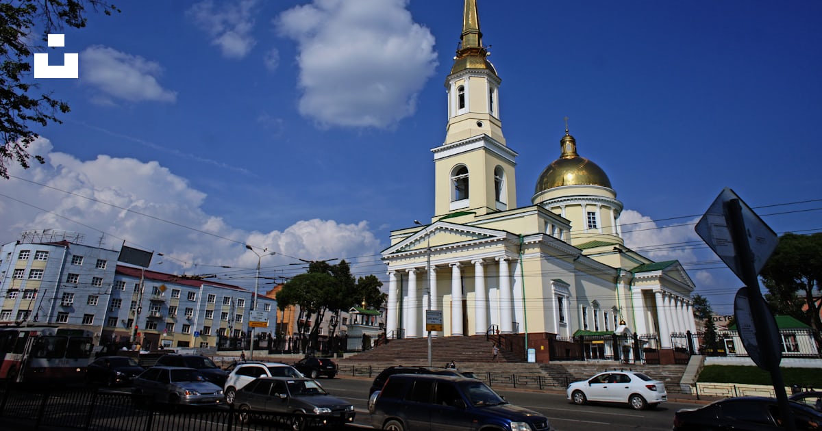 A Church With A Steeple And A Golden Dome Photo Free Car Image On