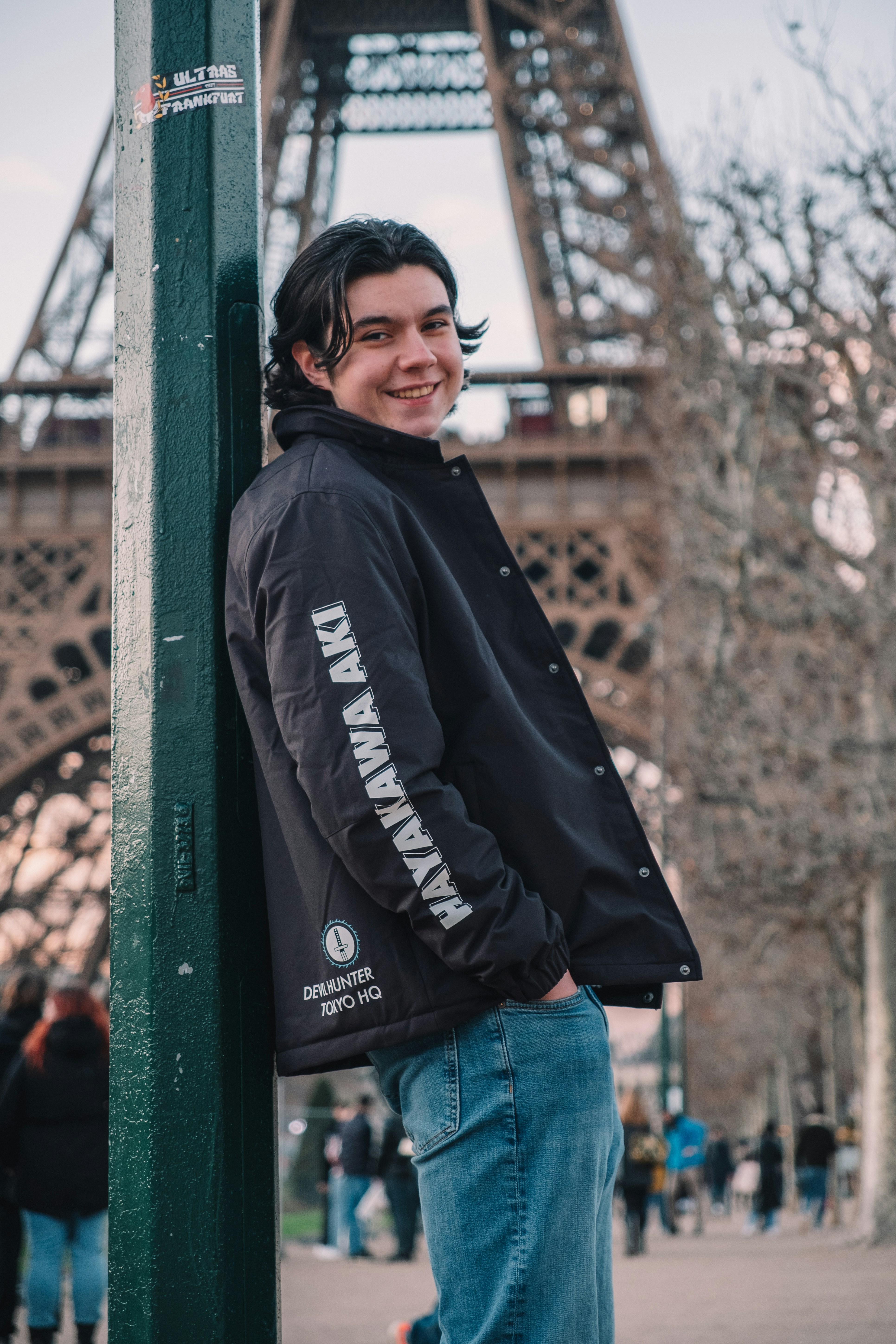 Iron Post Portrait: A Quiet Confidence Under the City Bridge