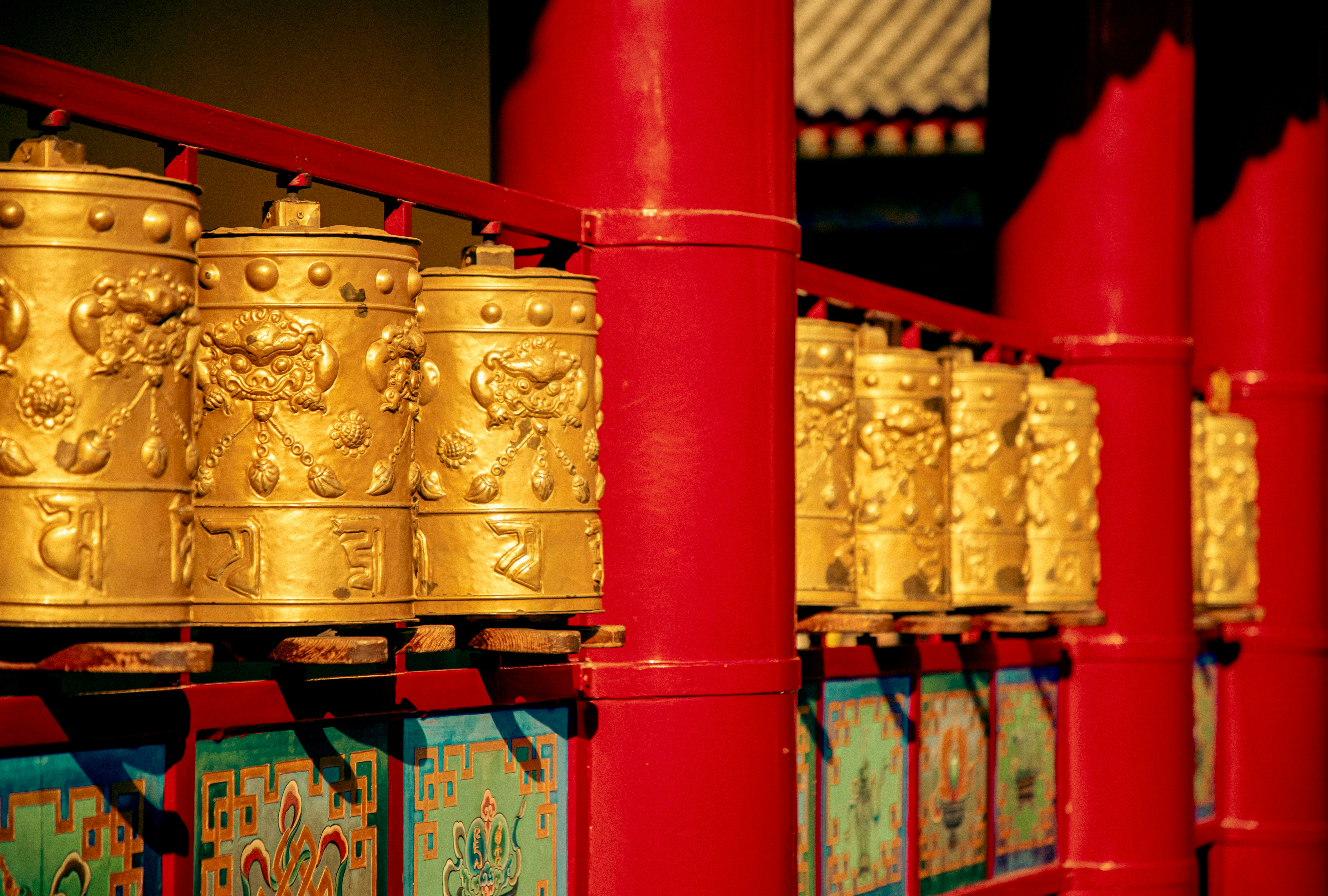 A row of gold bells sitting next to each other photo – Free Church ...