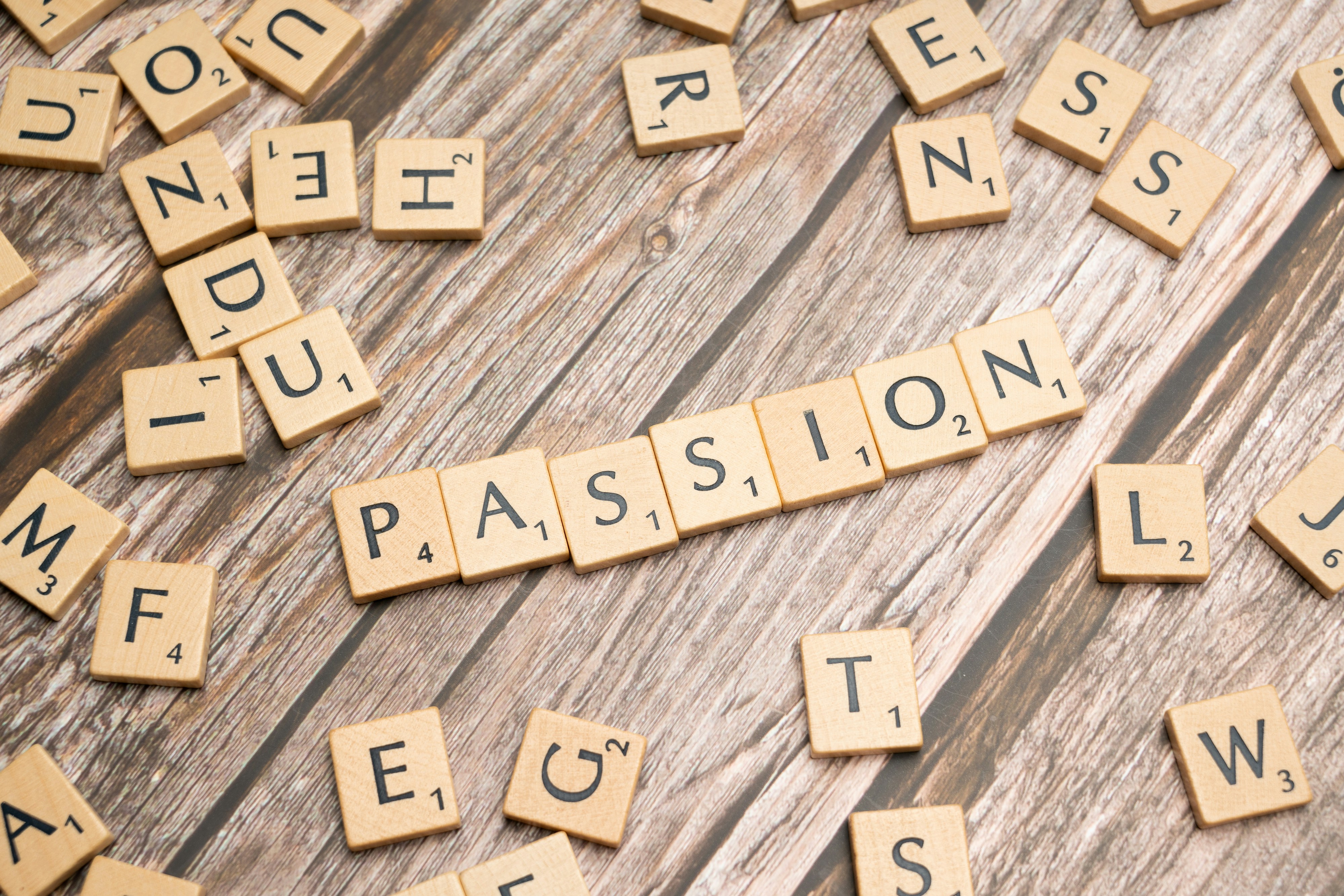Scrabble tiles spelling out the word passion photo – Free Number Image ...