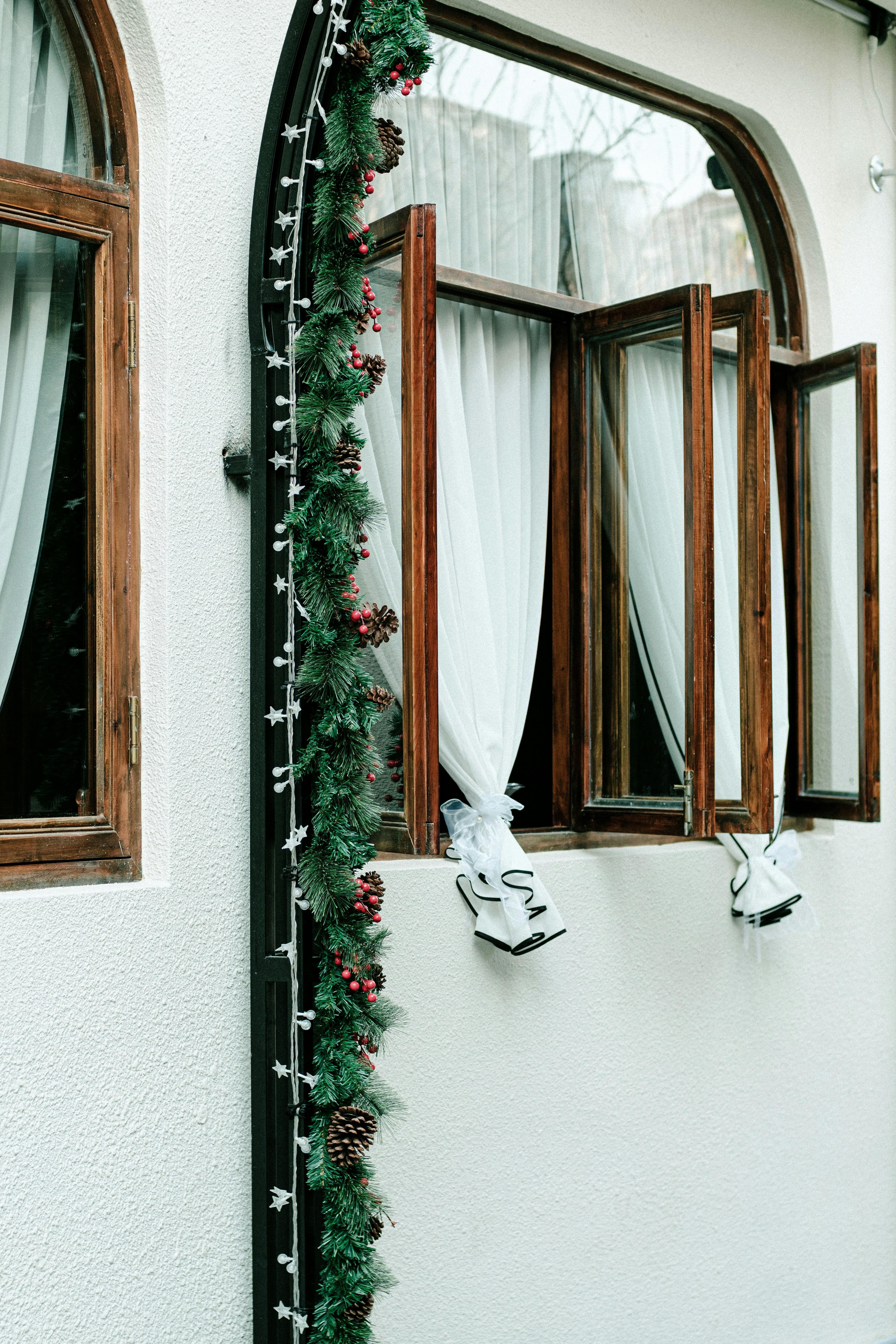 Open Windows with Holiday Garland