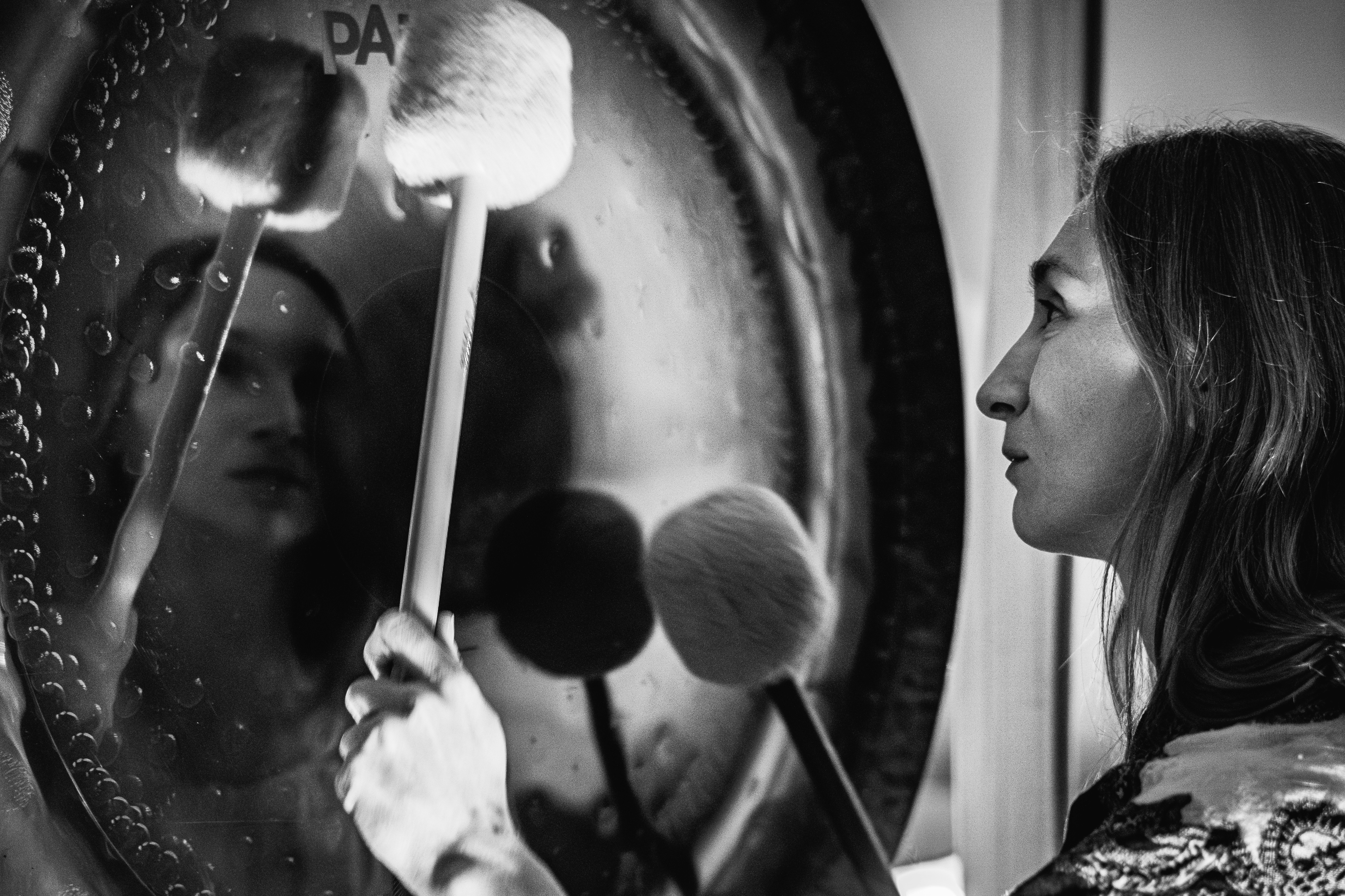 Studio Glow: A Makeup Brush Reflects a Quiet Portrait