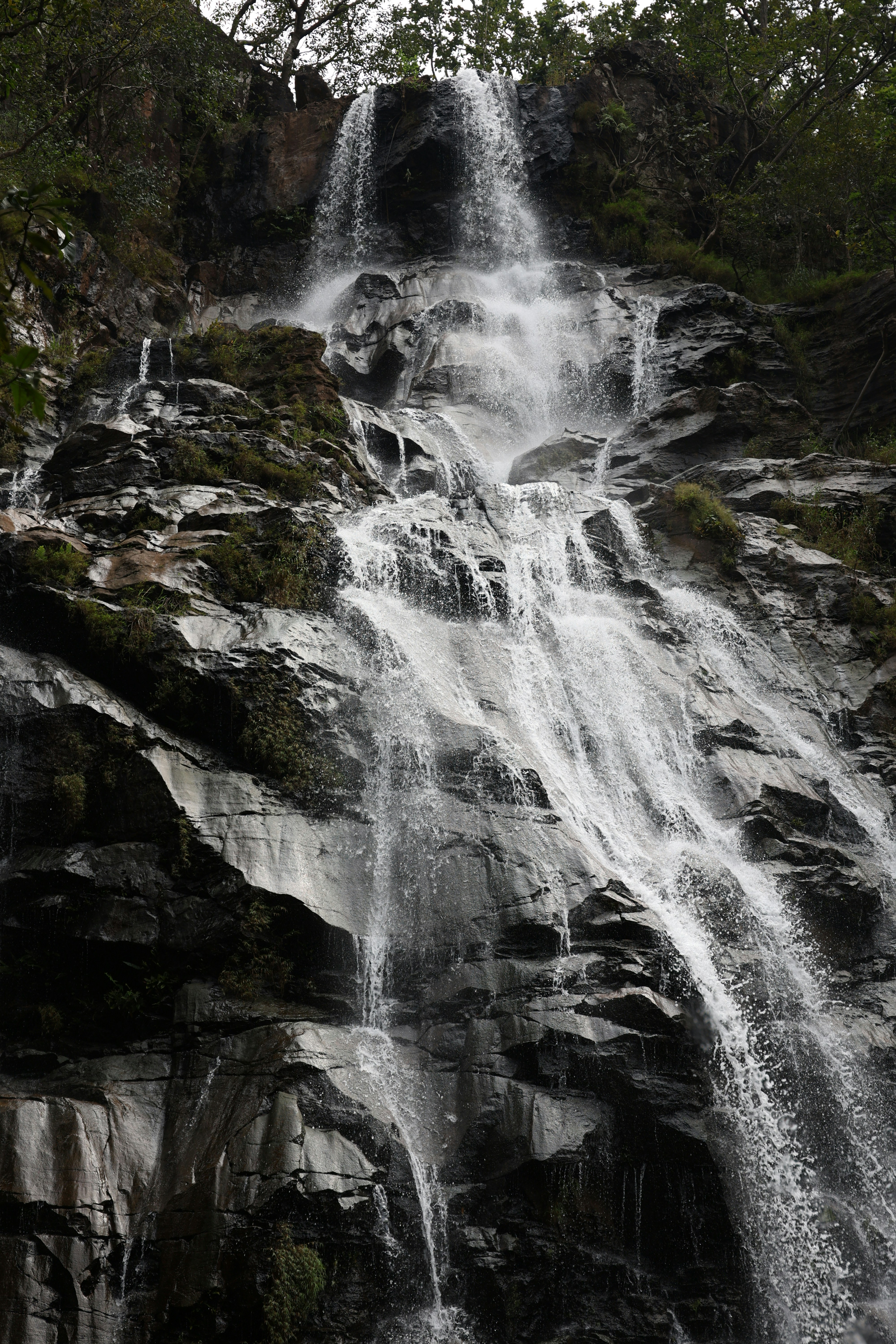 A very tall waterfall with lots of water photo – Free Grey Image on ...