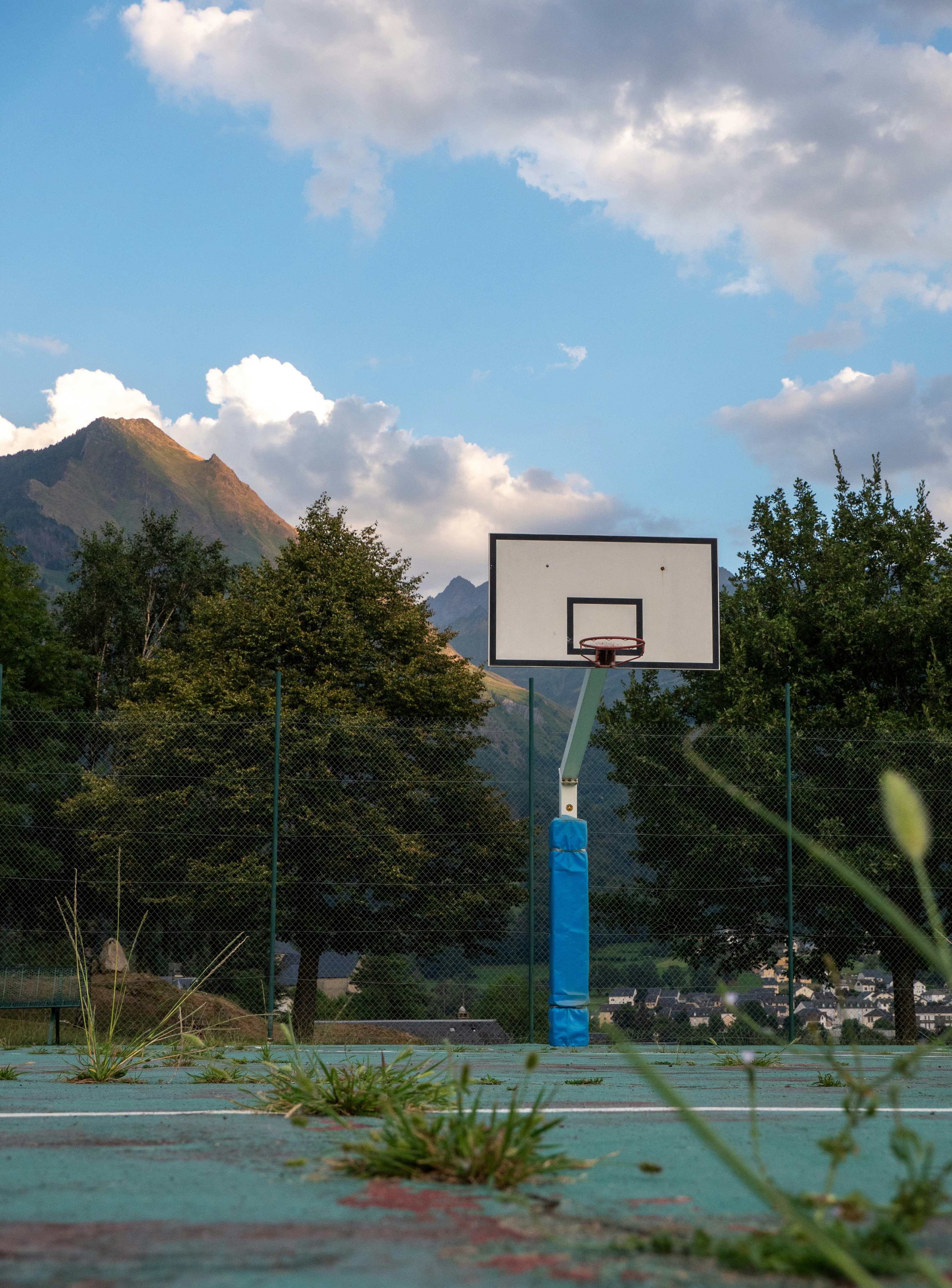 Alpine Court: Basketball Hoop with Mountain Backdrop