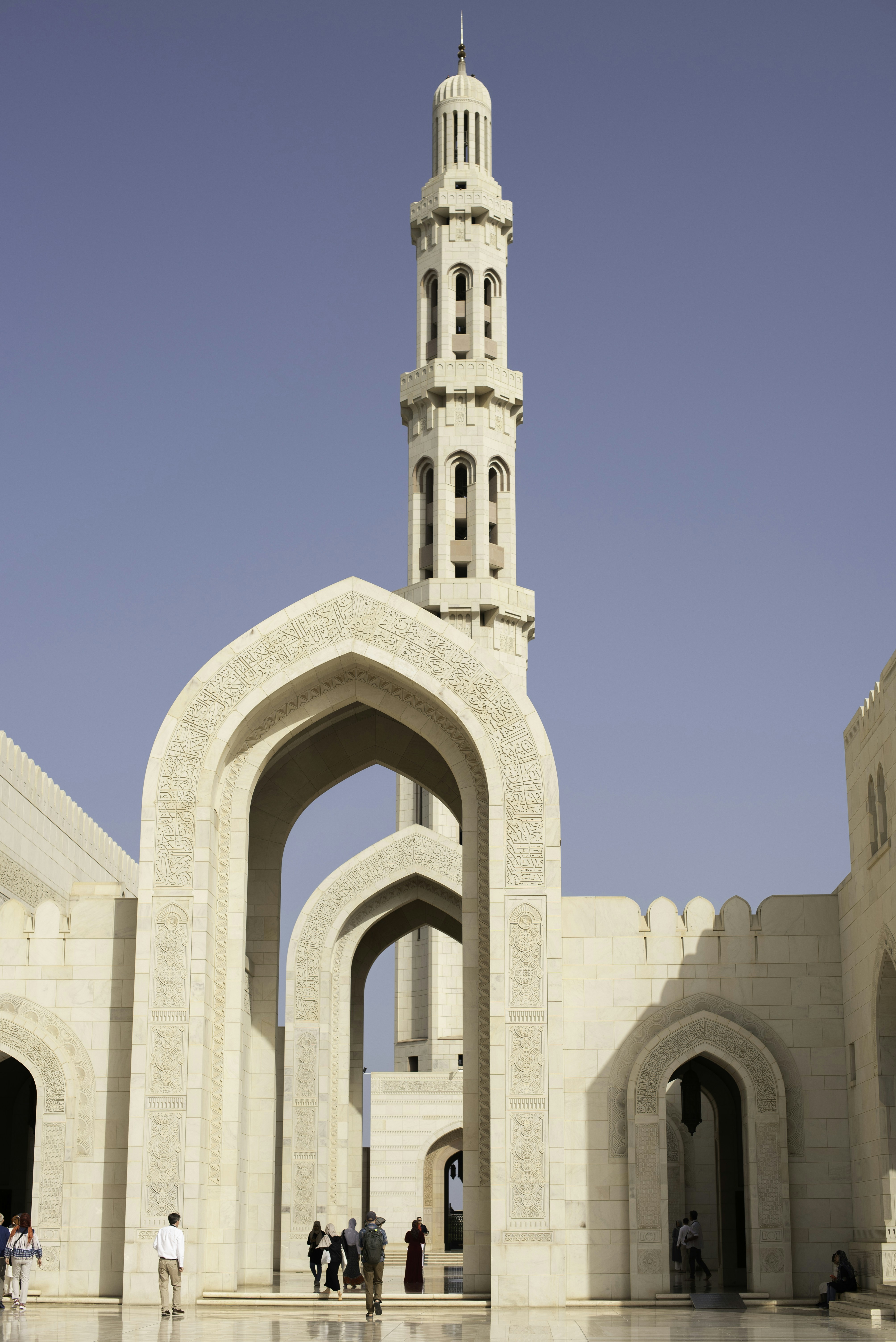 A large white building with a clock tower photo – Free Muscat Image on ...