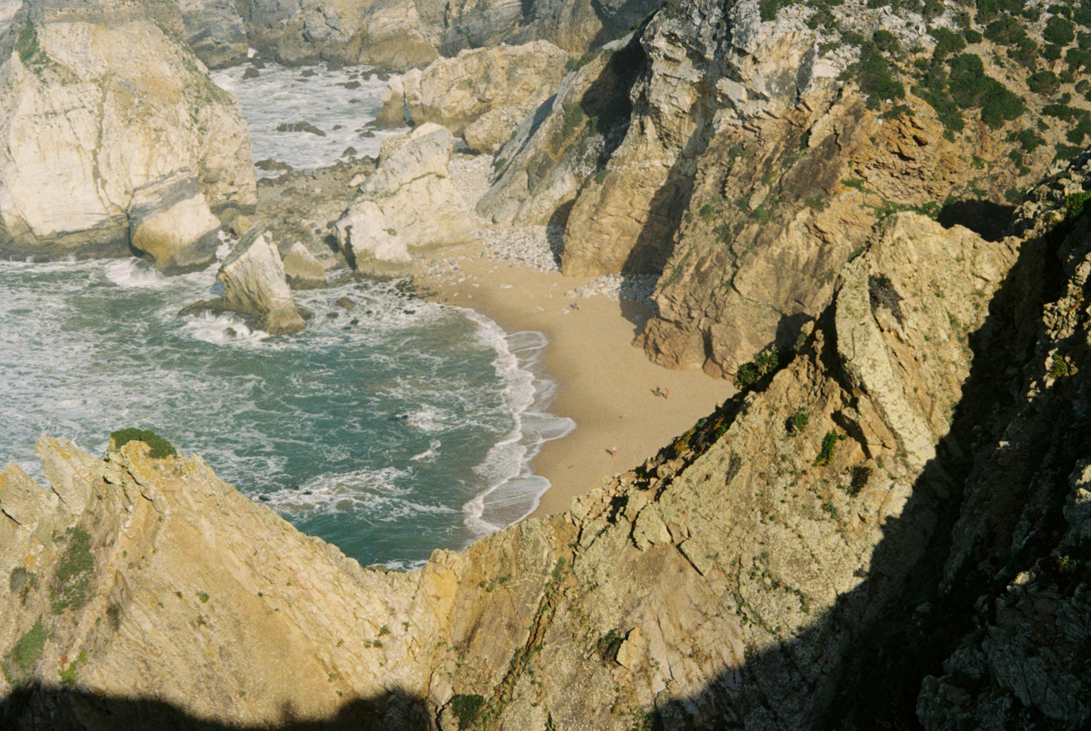 Cove Between Weathered Cliffs: Light and Sea