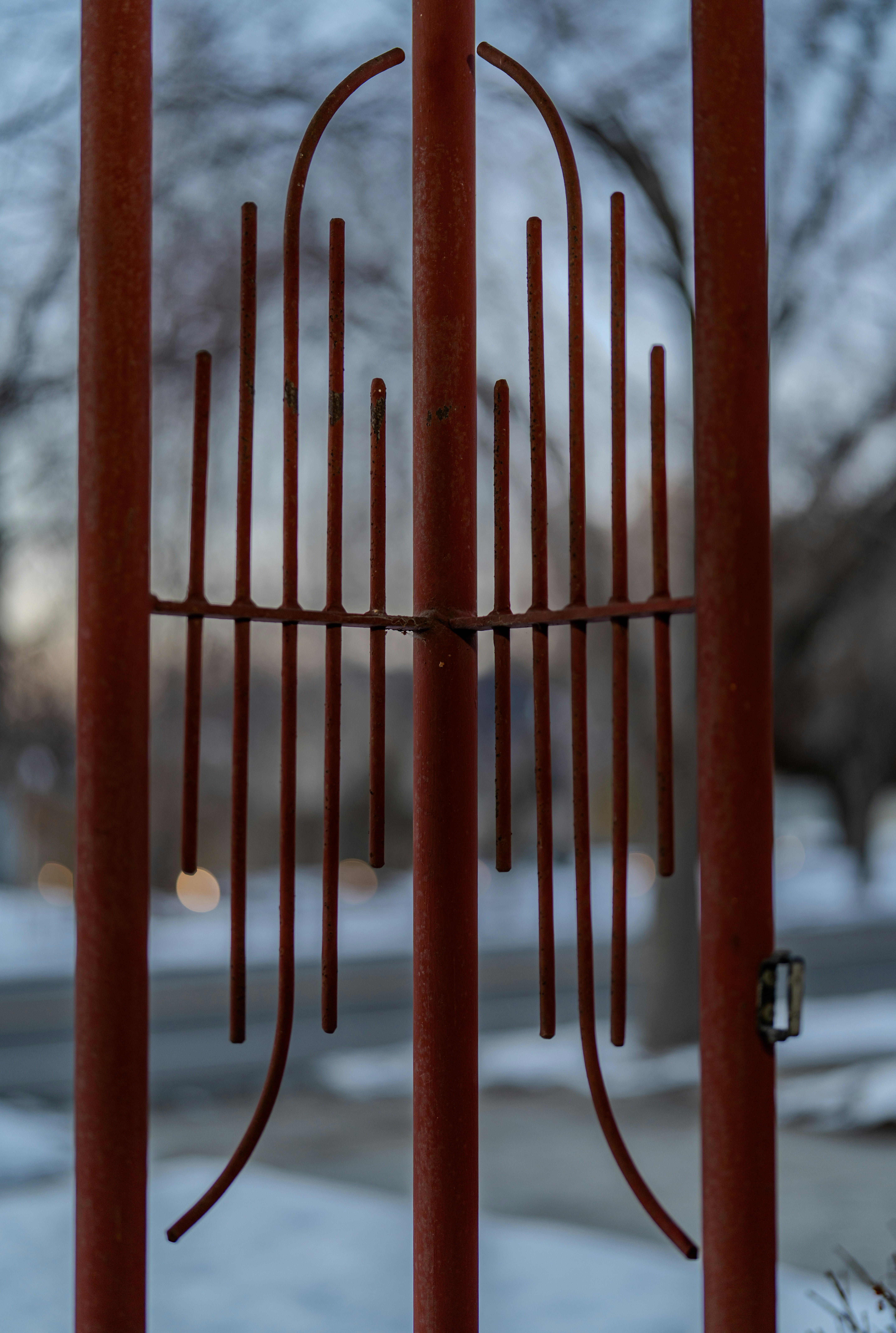 a close up of a metal object in the snow