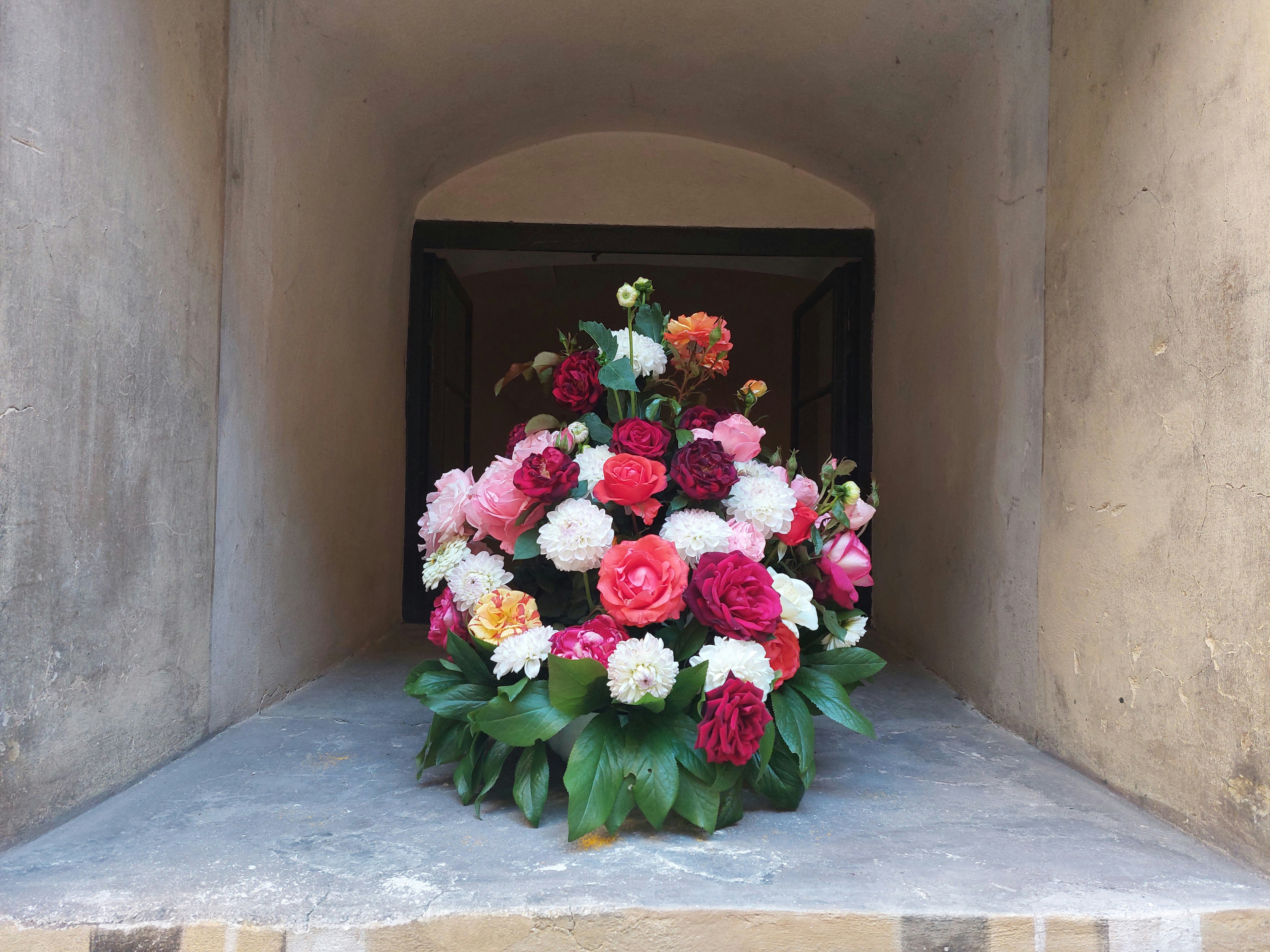 Threshold Bloom: A Bouquet Brightens the Stone Corridor