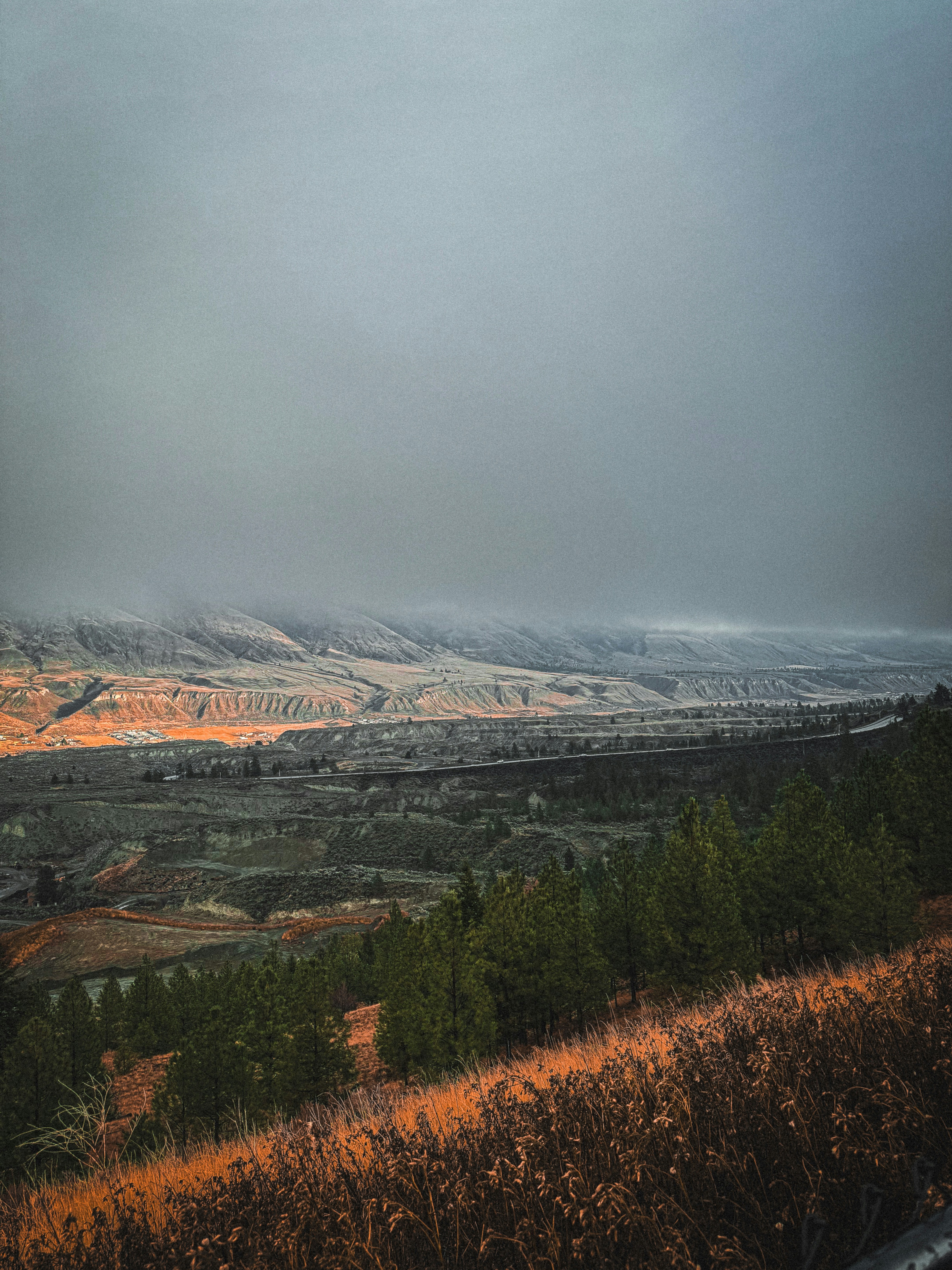 Ember Valleys Beneath a Veiled Horizon