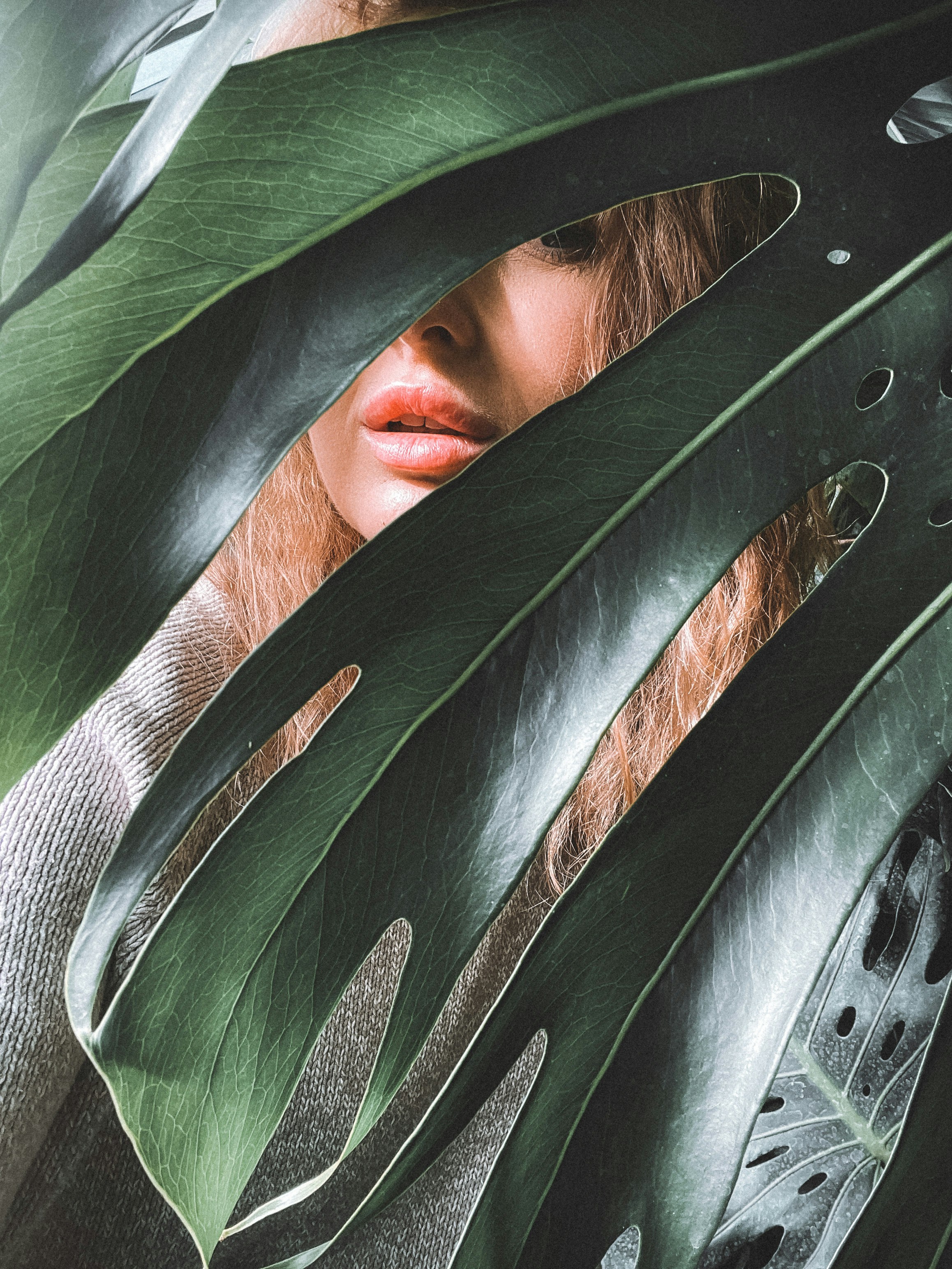 Veiled Gaze: A Mist of Leaves and Lip Color