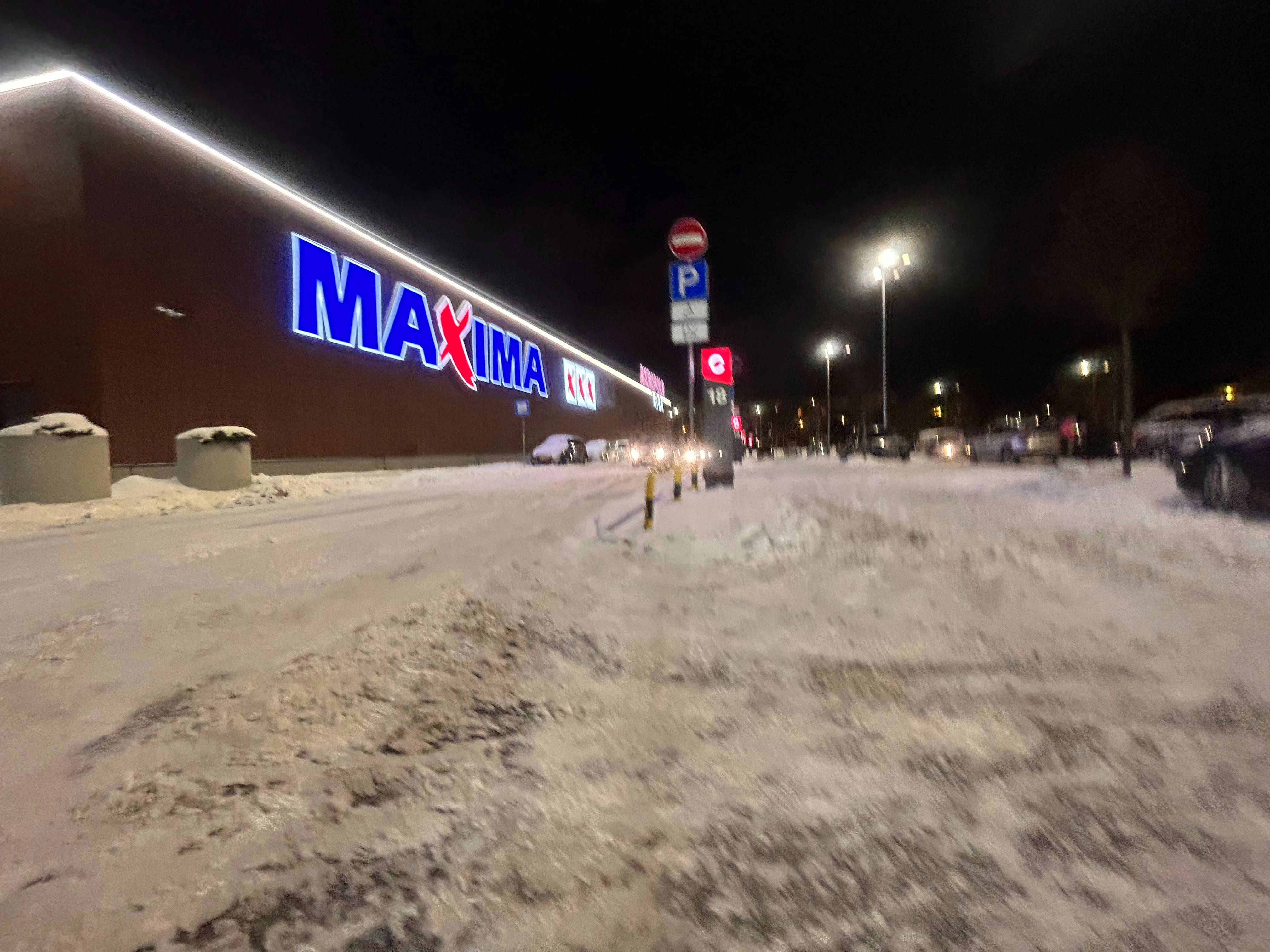 Some individuals might be examining snow shovels and salt supplies, indicating a focus on preparing for potential snowfall and its impact on daily life.