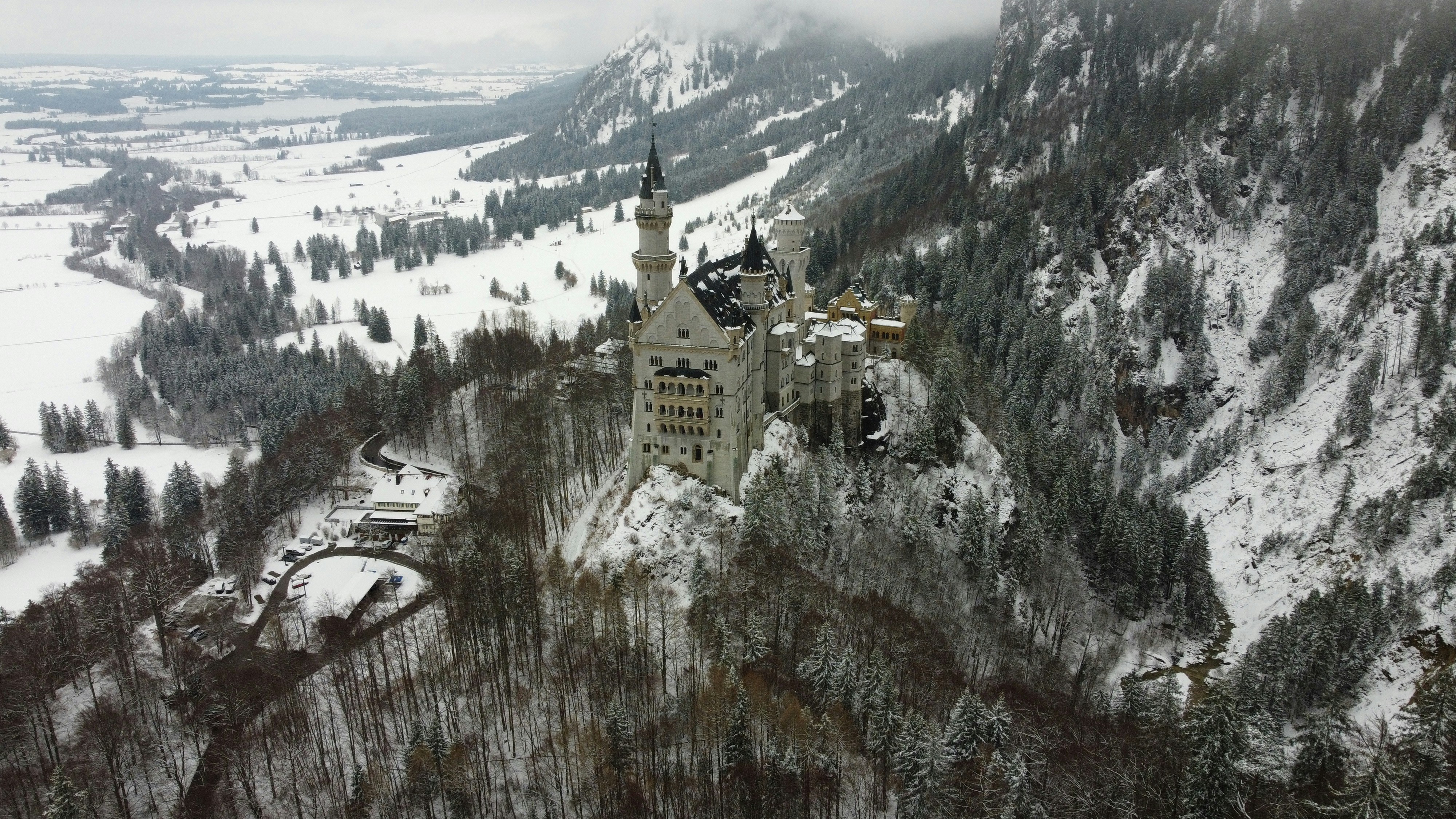 Whispering Fortress on a Snow-Crowned Cliff