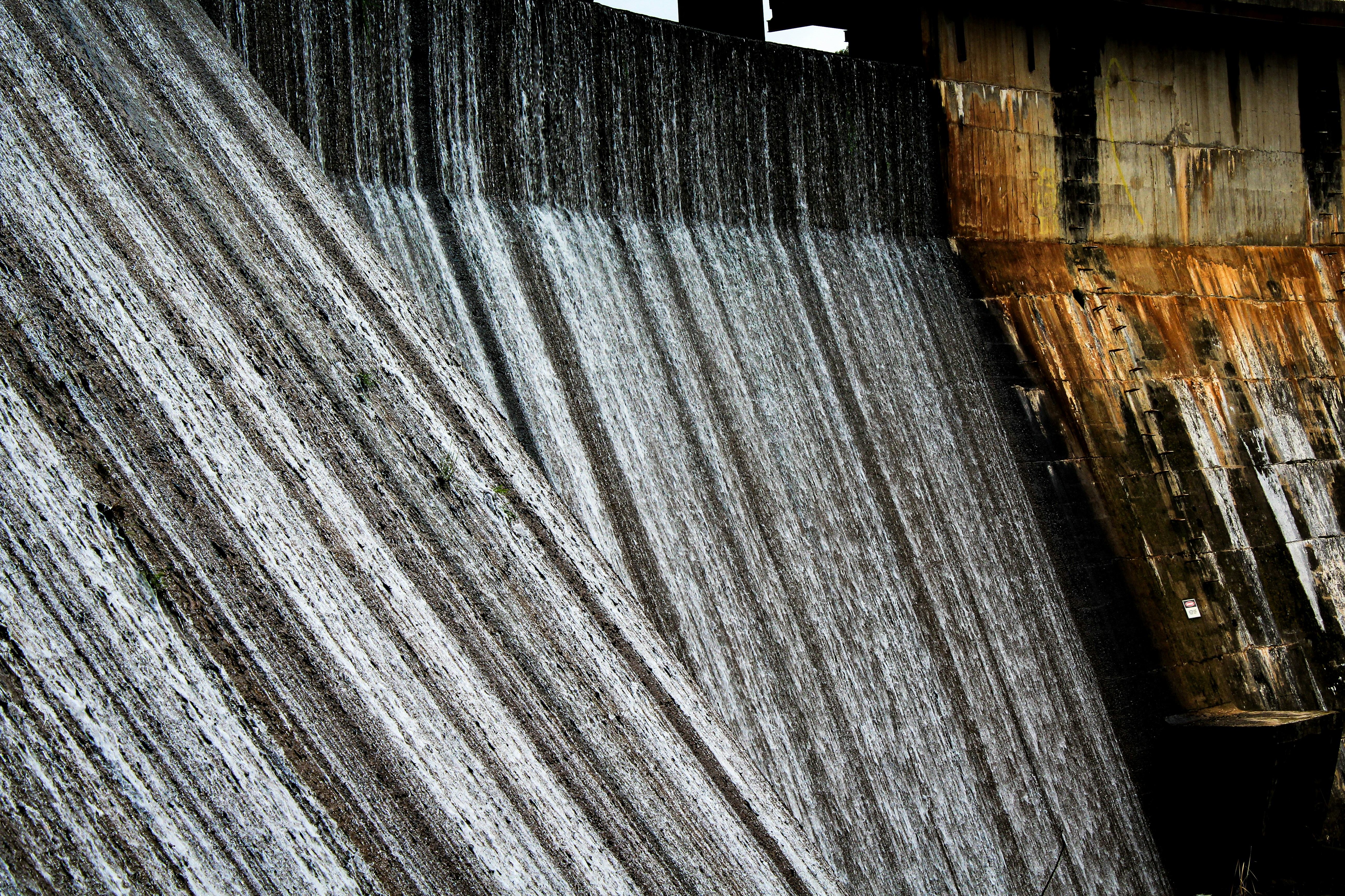 Diagonal Cascade Across Weathered Concrete