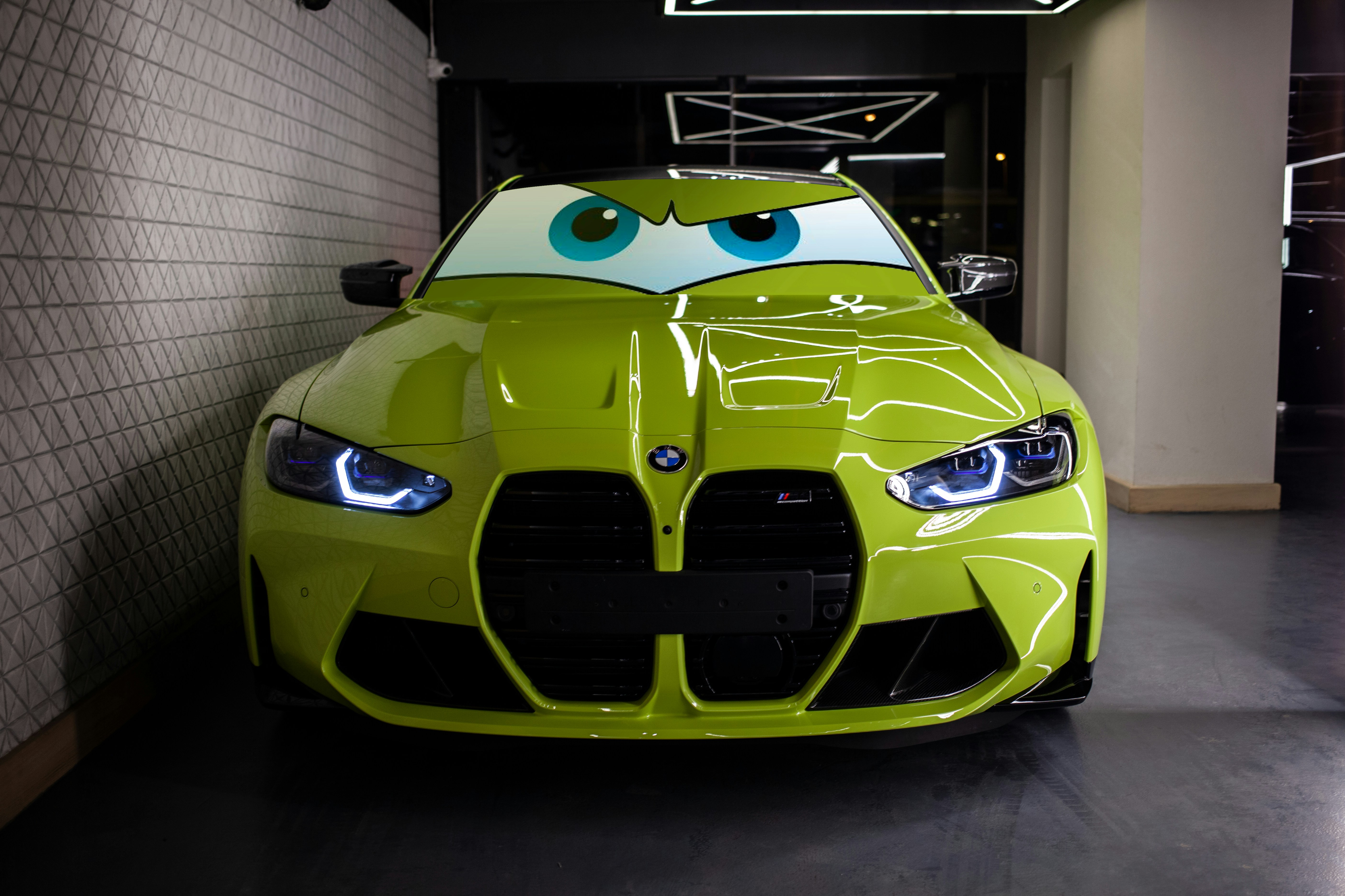 A green car with a face painted on it photo – Free Automobile Image on ...