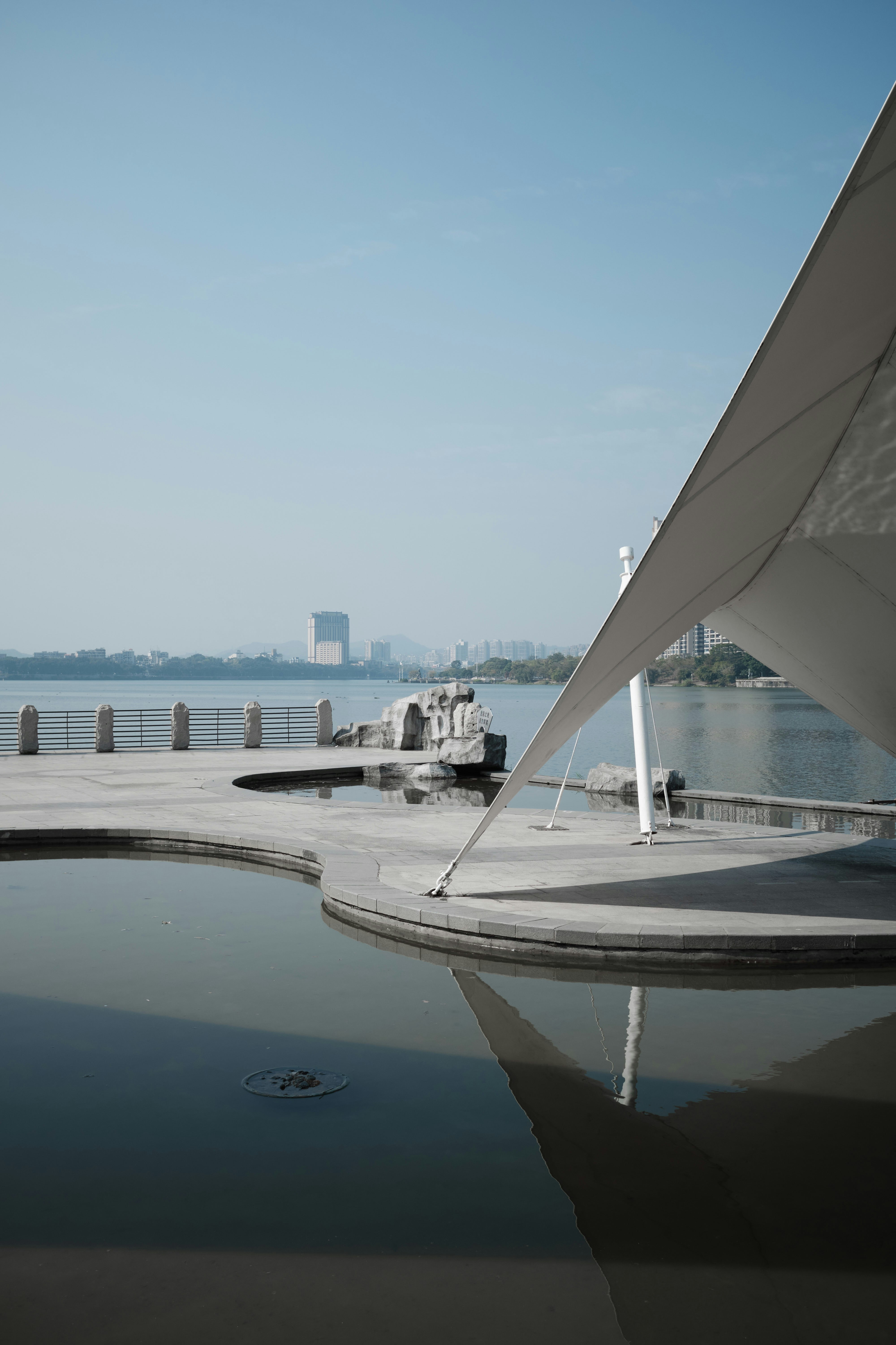 a boat sitting on top of a body of water