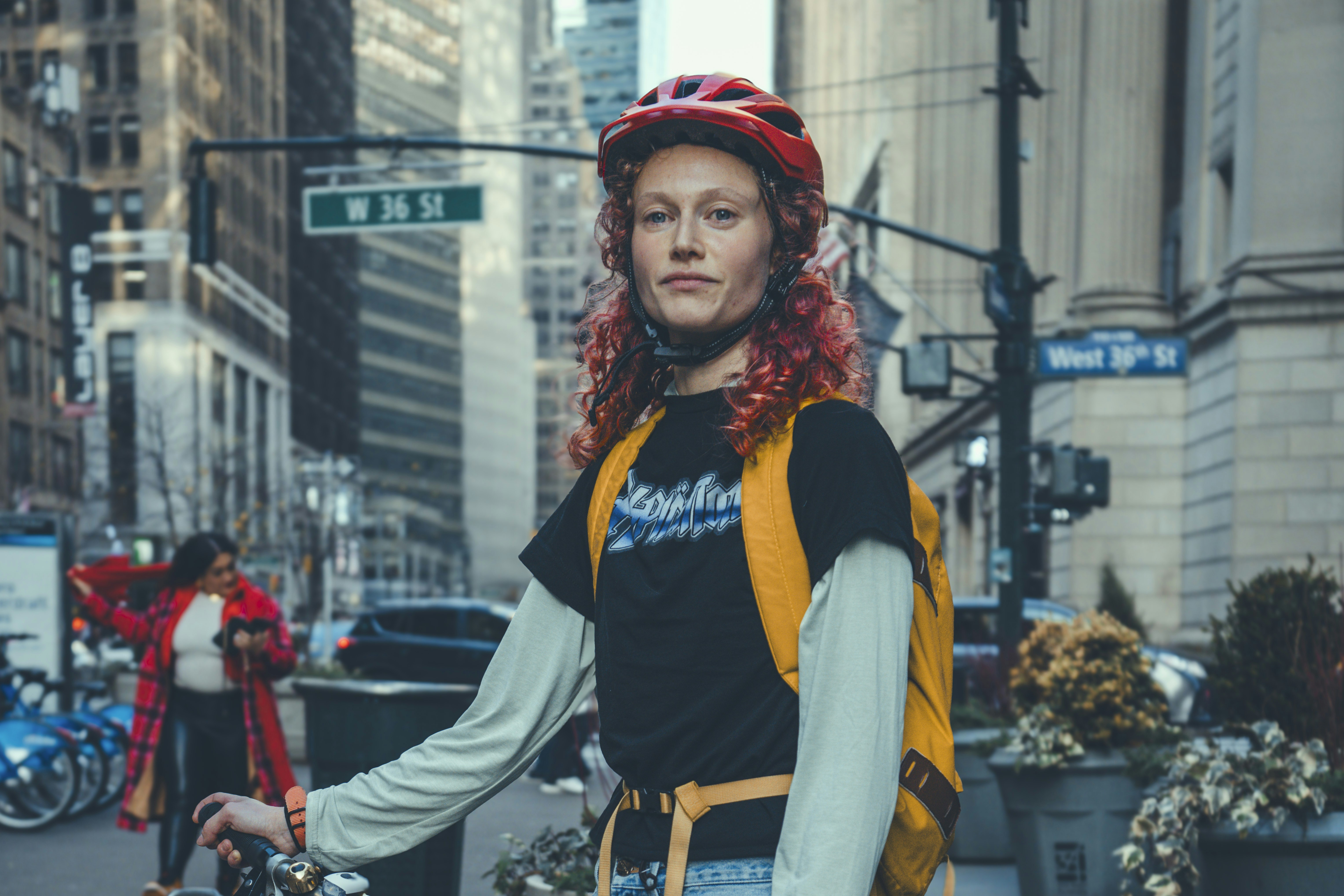 Red-Haired Cyclist on West 36th Street: a Quiet City Portrait