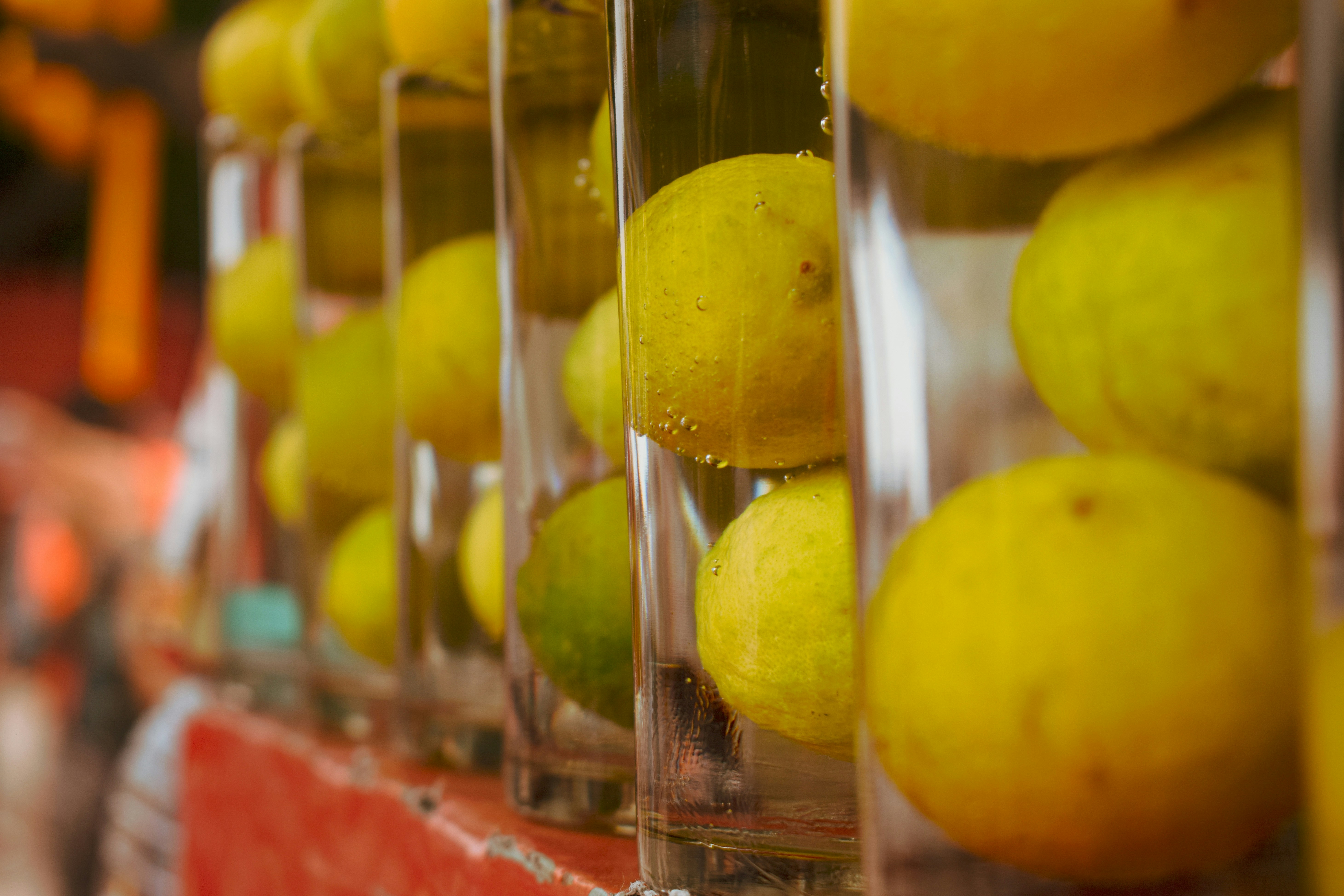 Lemon Columns: Golden Orbs Framed in Glass Dispensers