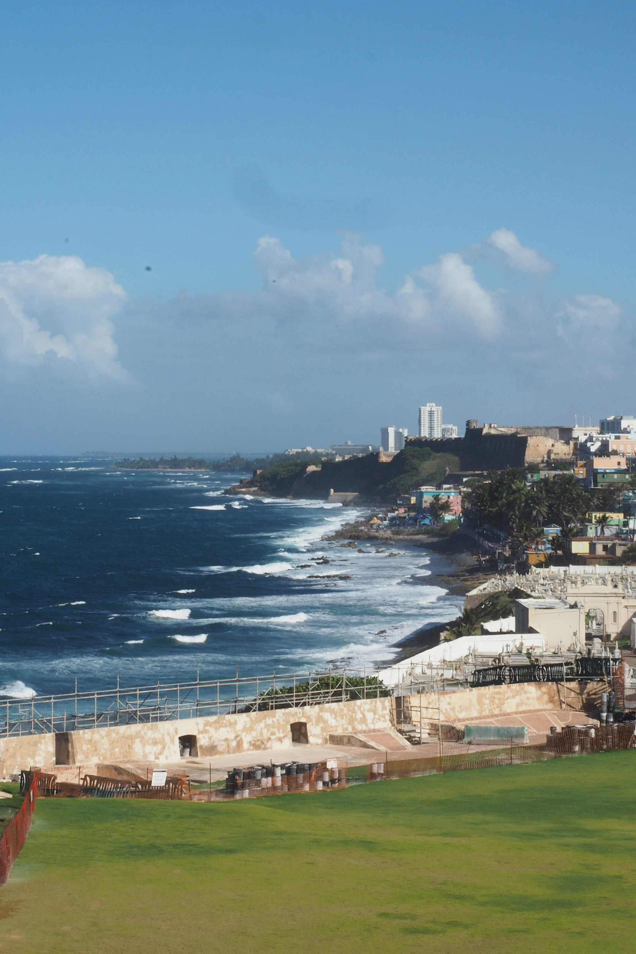 Cliffside Promenade: A Sea-Front City Unfolds Along the Horizon