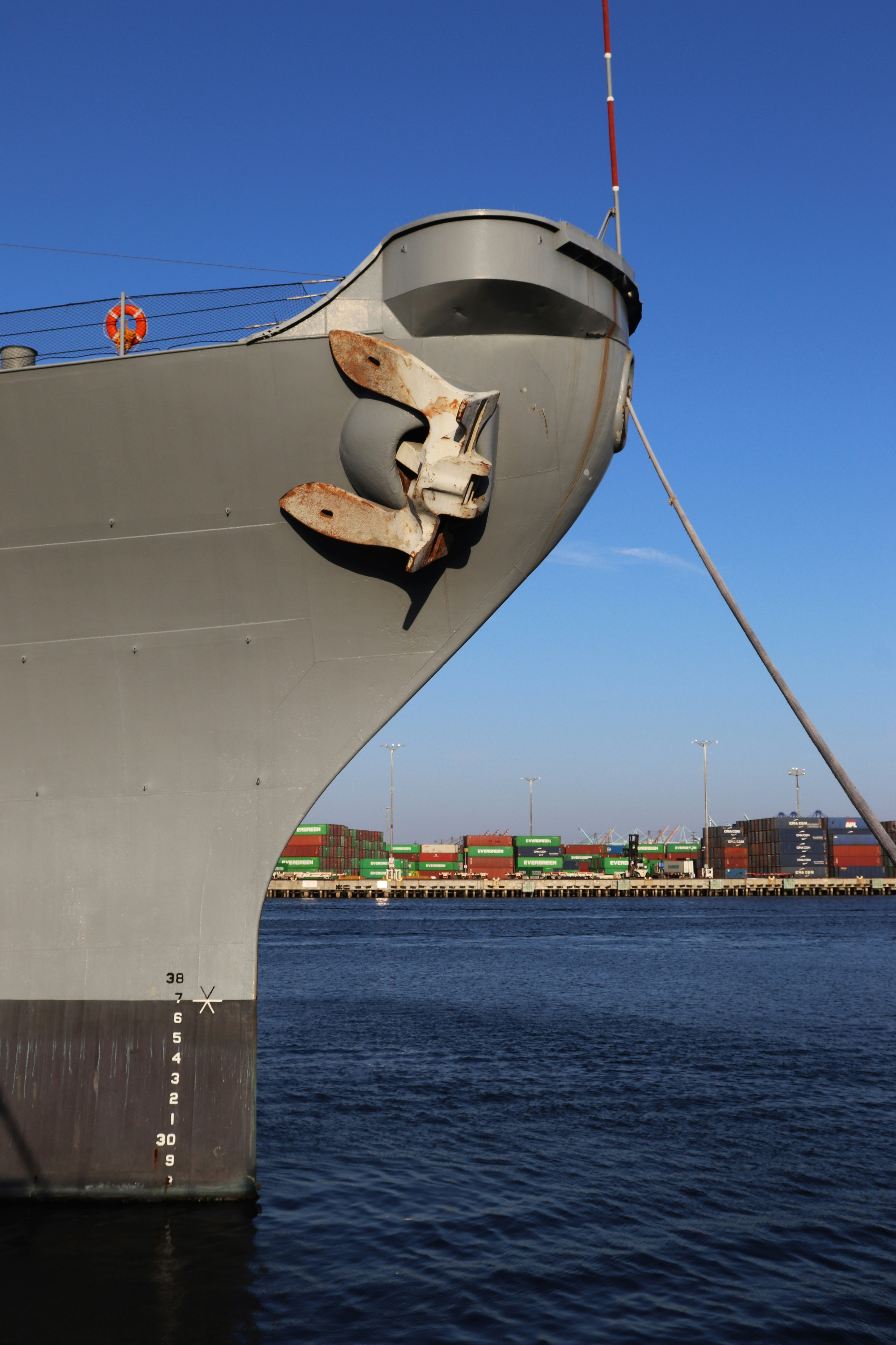 A large gray boat in a body of water photo – Free Waterfront Image on ...
