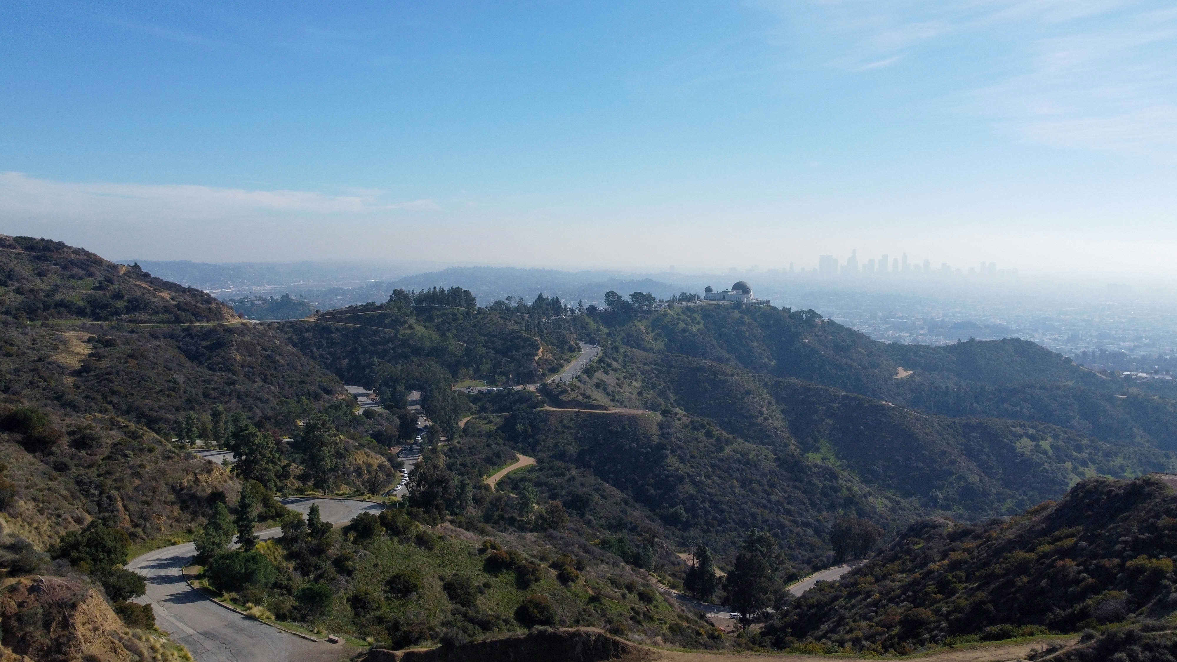 Horizon Ridge: A Rolling Portrait of Hills and Distant City