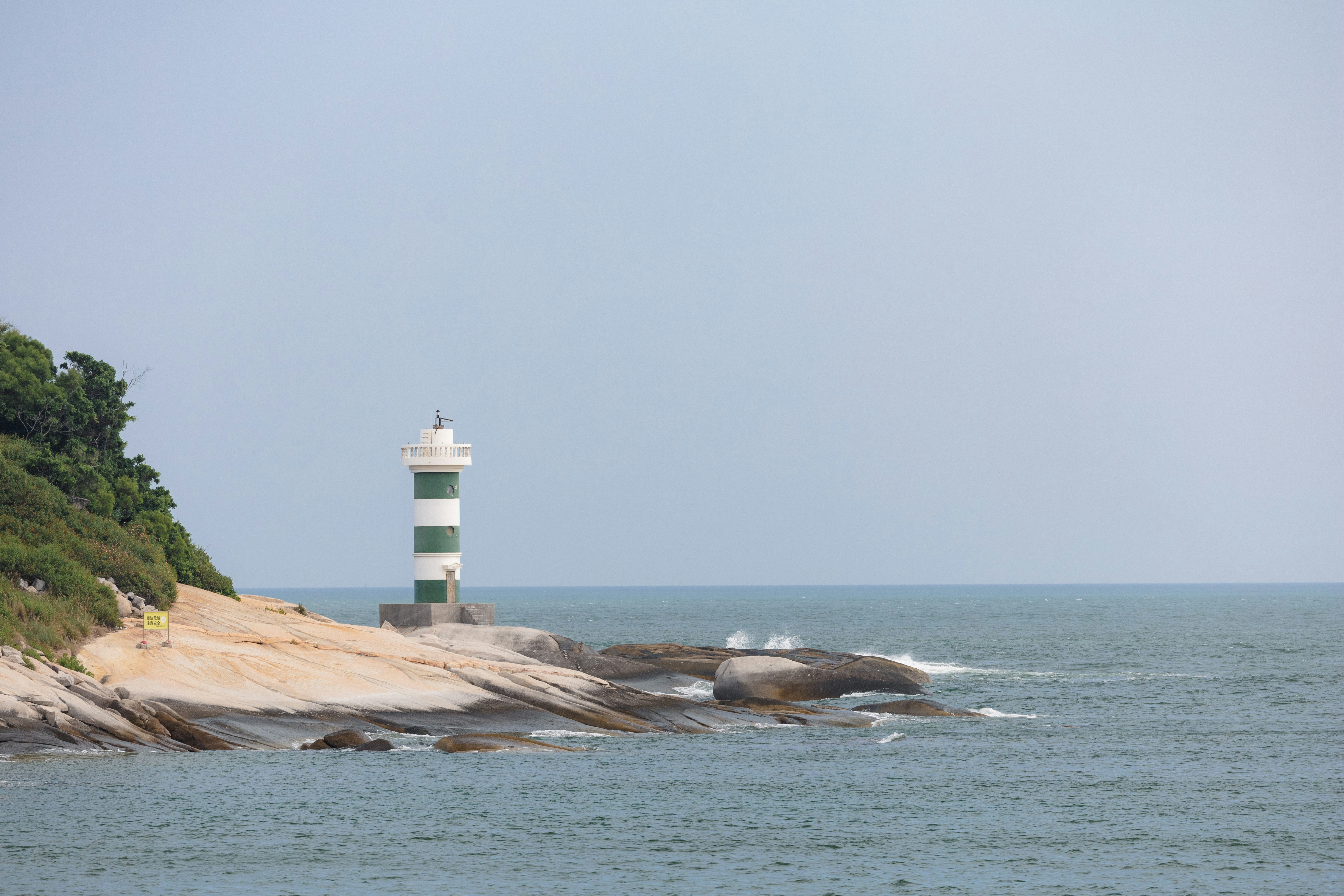 Harbor Beacon: a lone lighthouse watching the crest of the sea