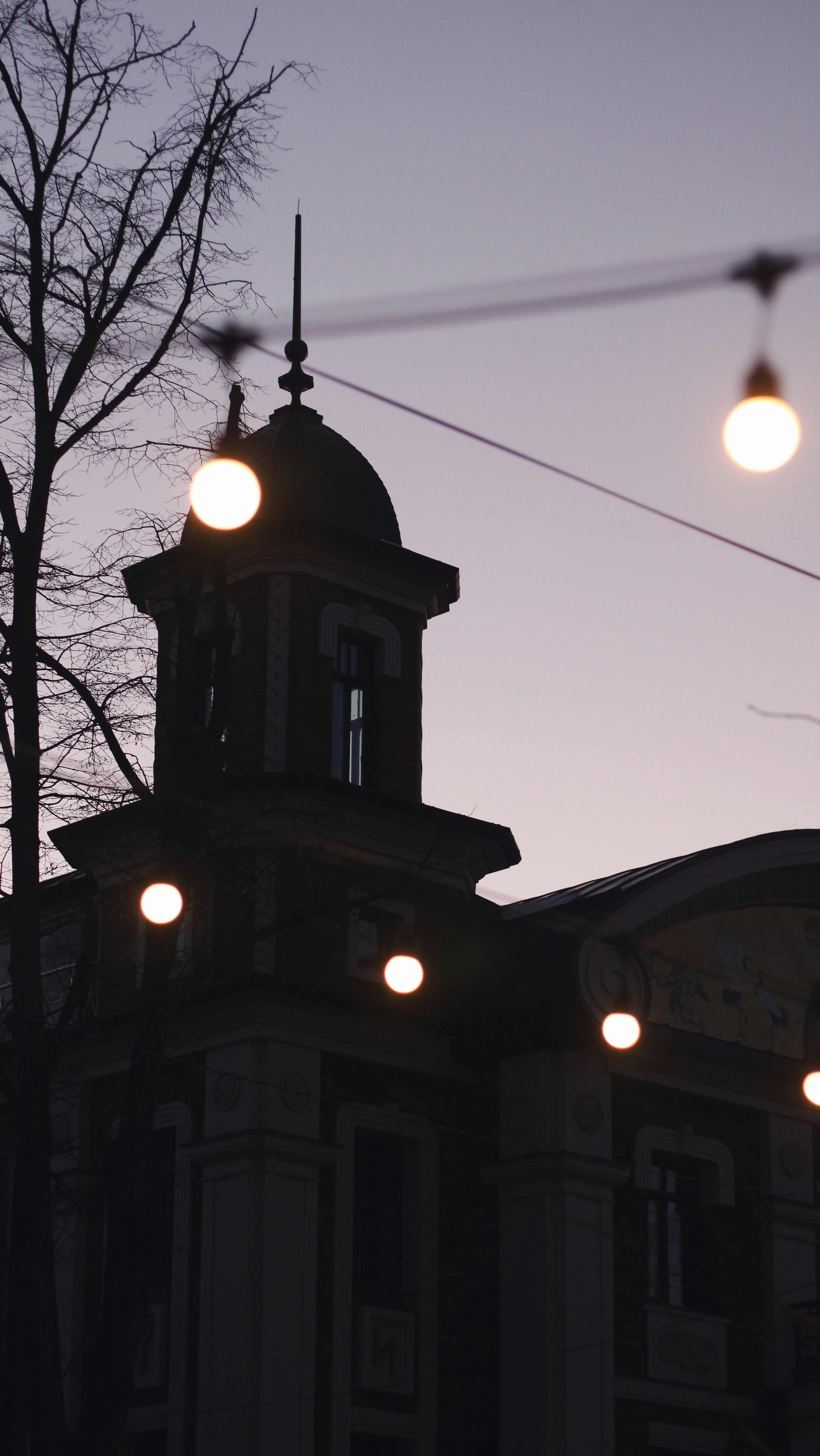 Twilight Dome: Lanterns Draping a Historic Clocktower