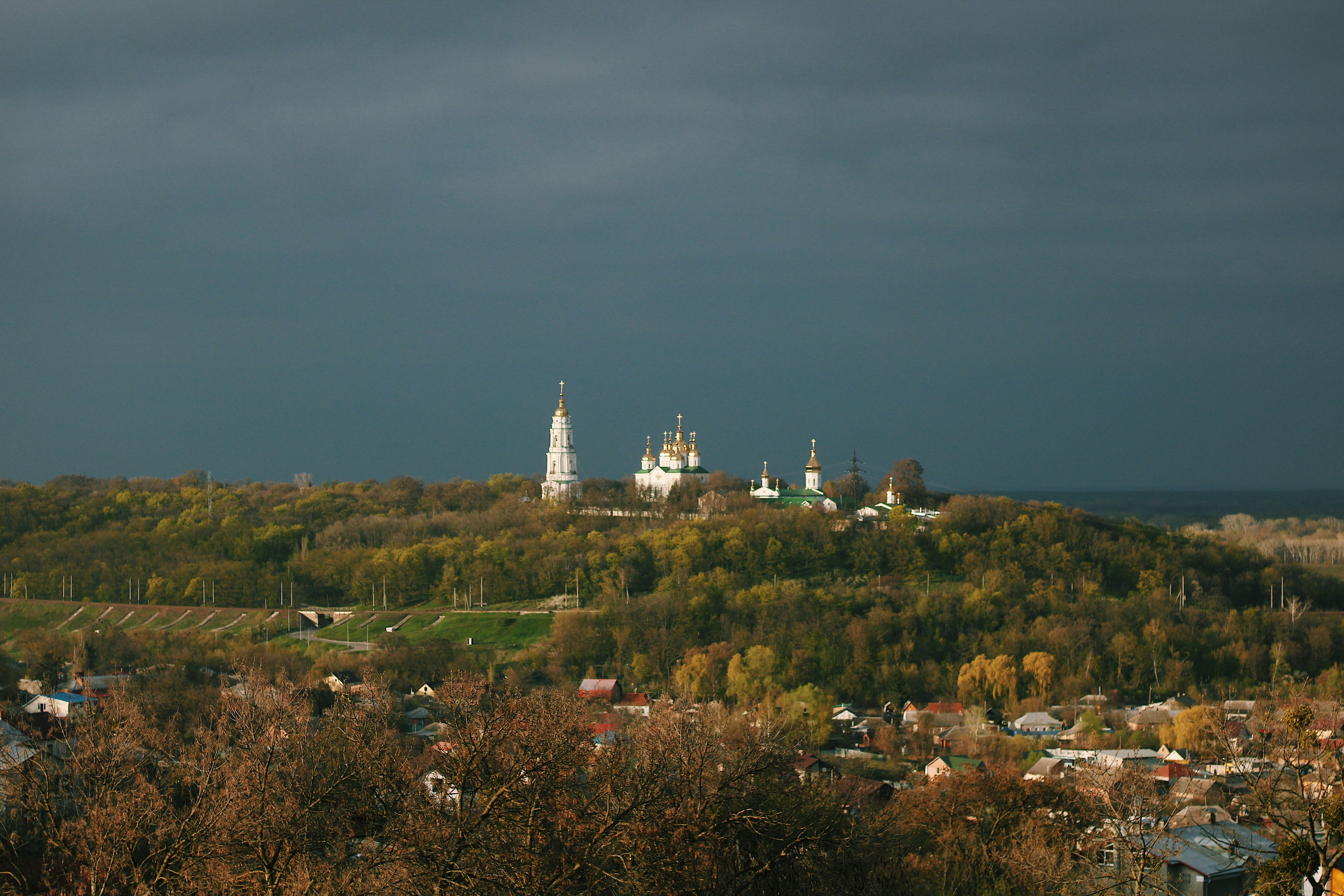 Ivory Spires on a Russet Hilltop at Autumn's Edge