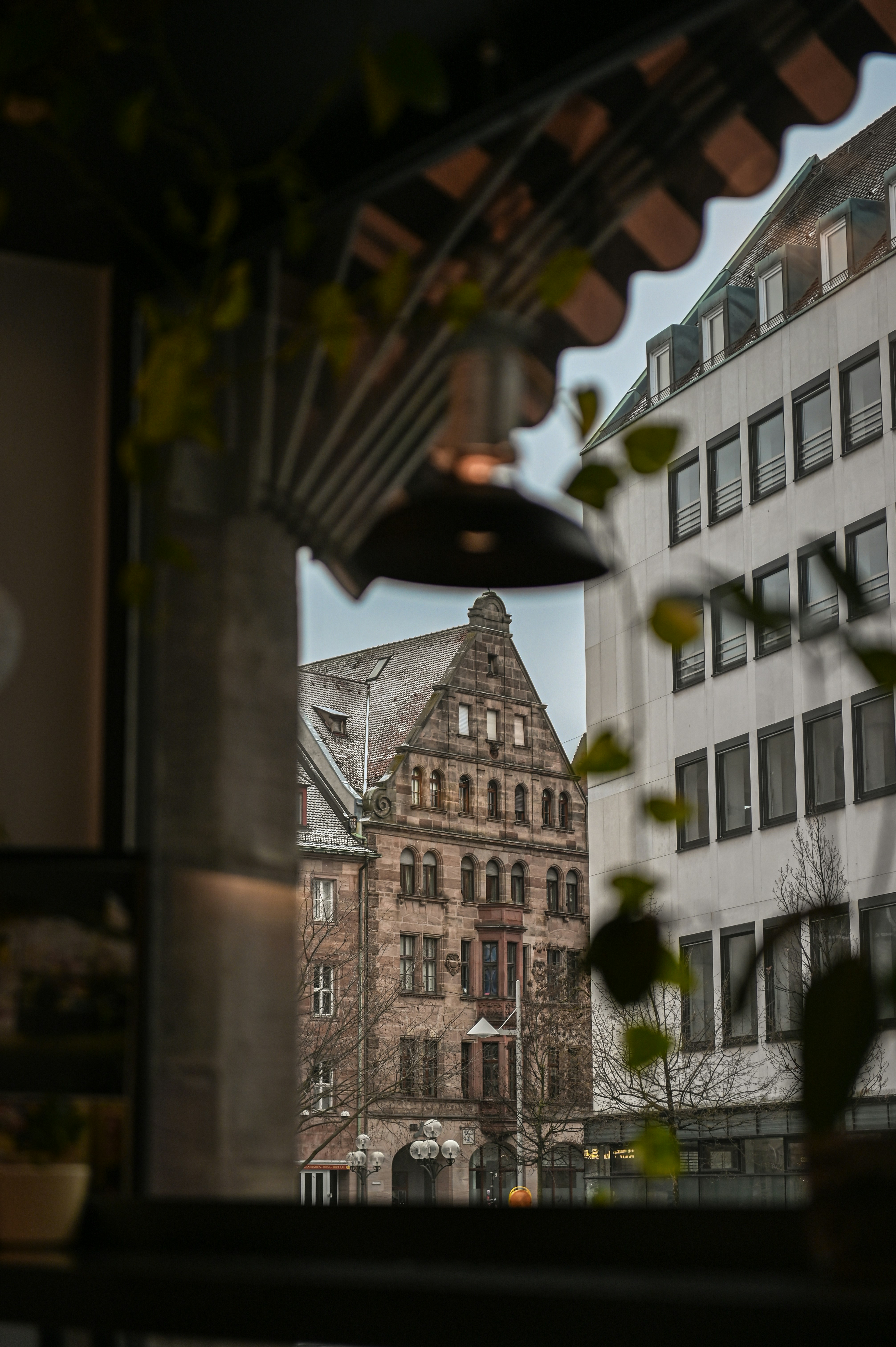 A view of a building through a window photo – Free Germany Image on ...