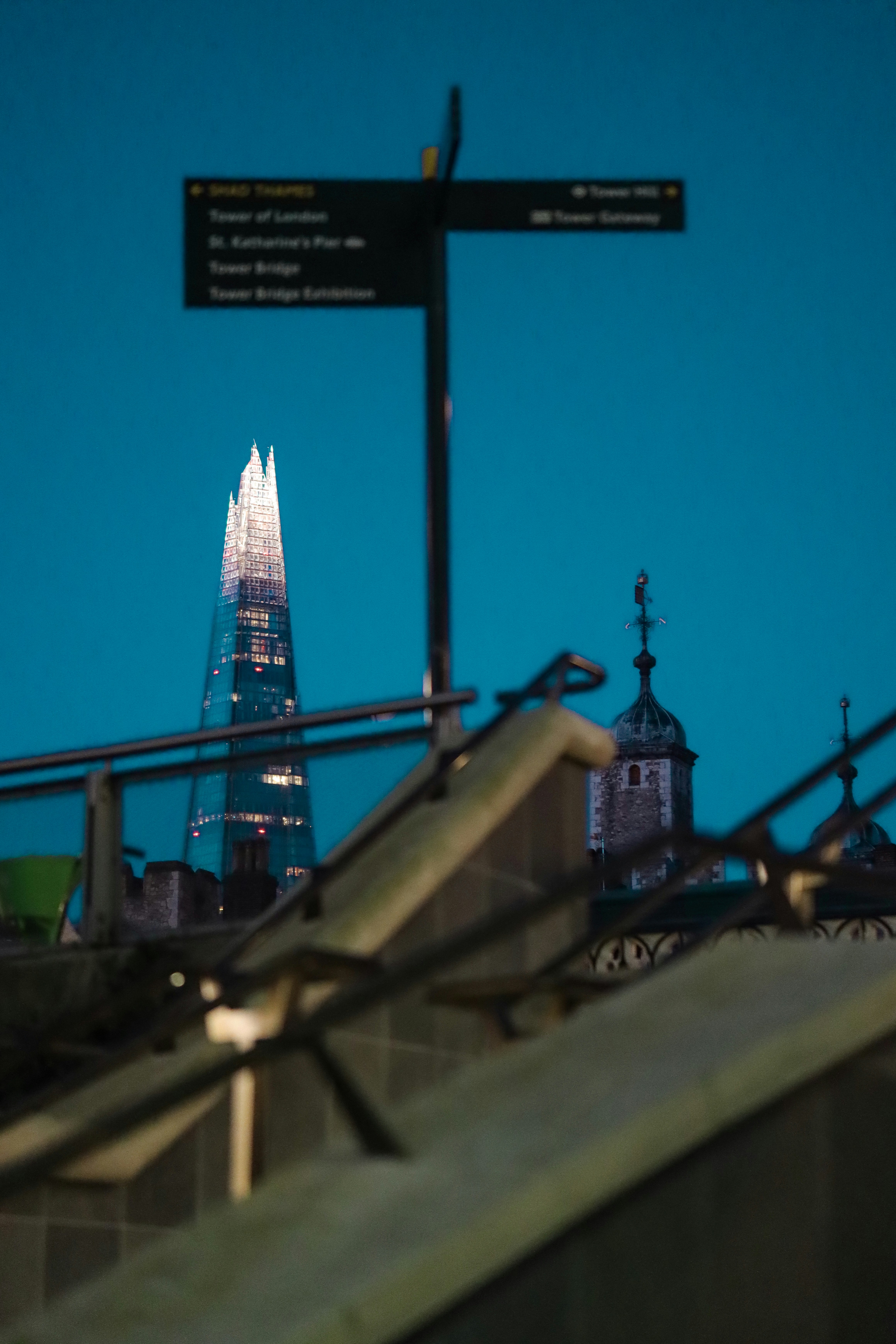 Shard in Blue Hour: London Skyline Framed by Rooftop Rails