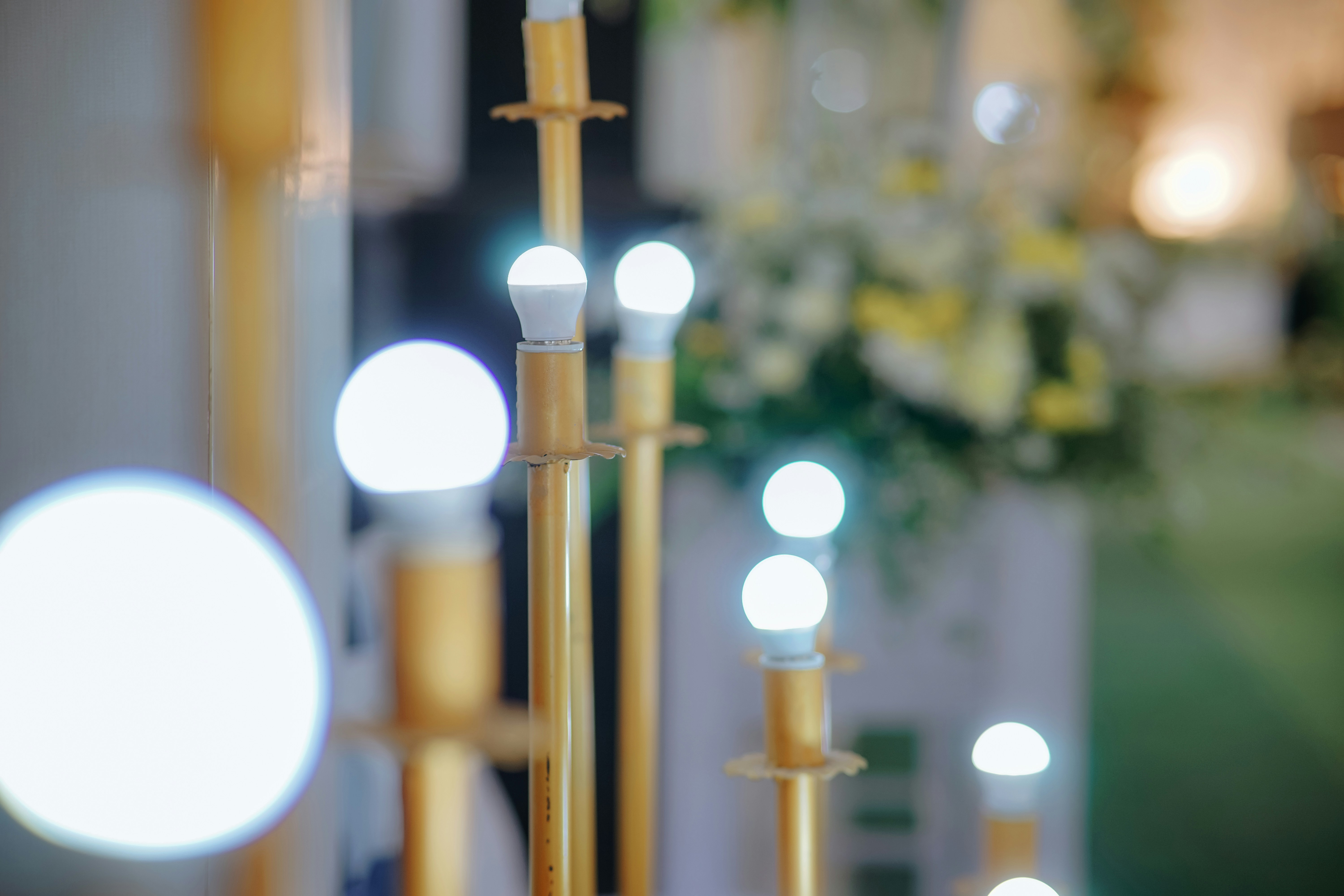 Row of Luminous Bamboo Rods: Soft Orbs in a Night Garden