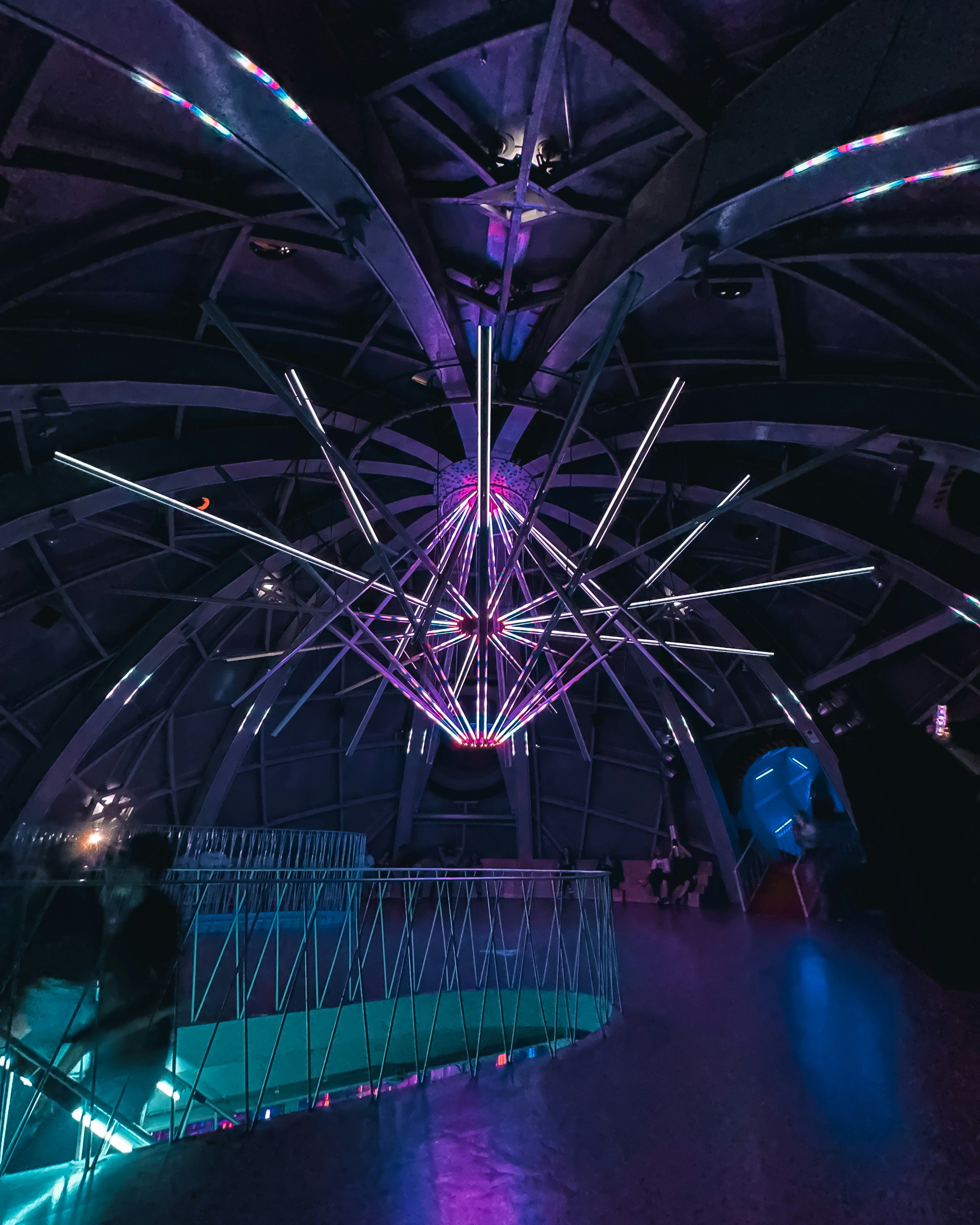 Neon Starburst Under a Geometric Dome
