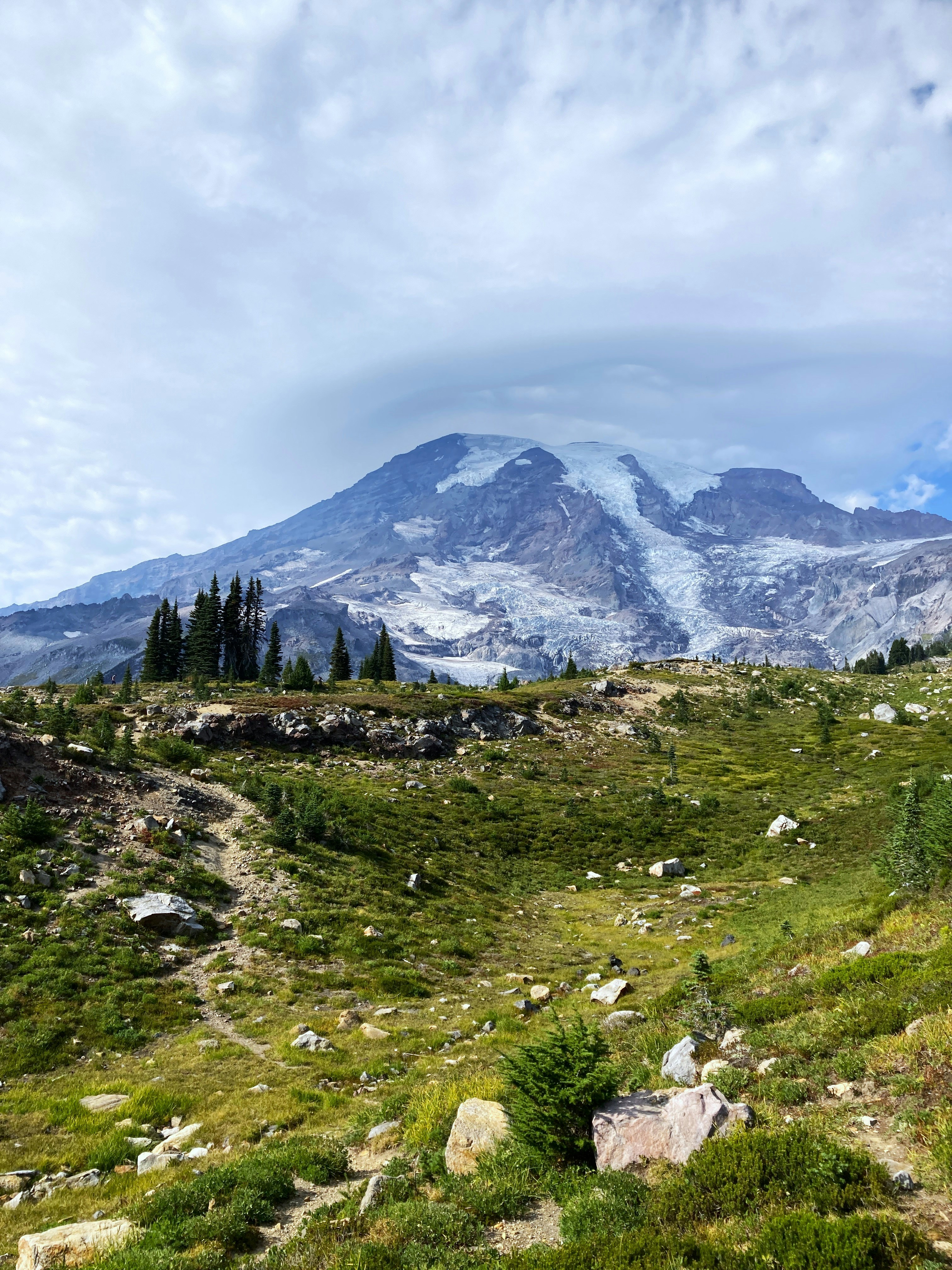 A mountain with a snow capped peak in the distance photo – Free Peak ...