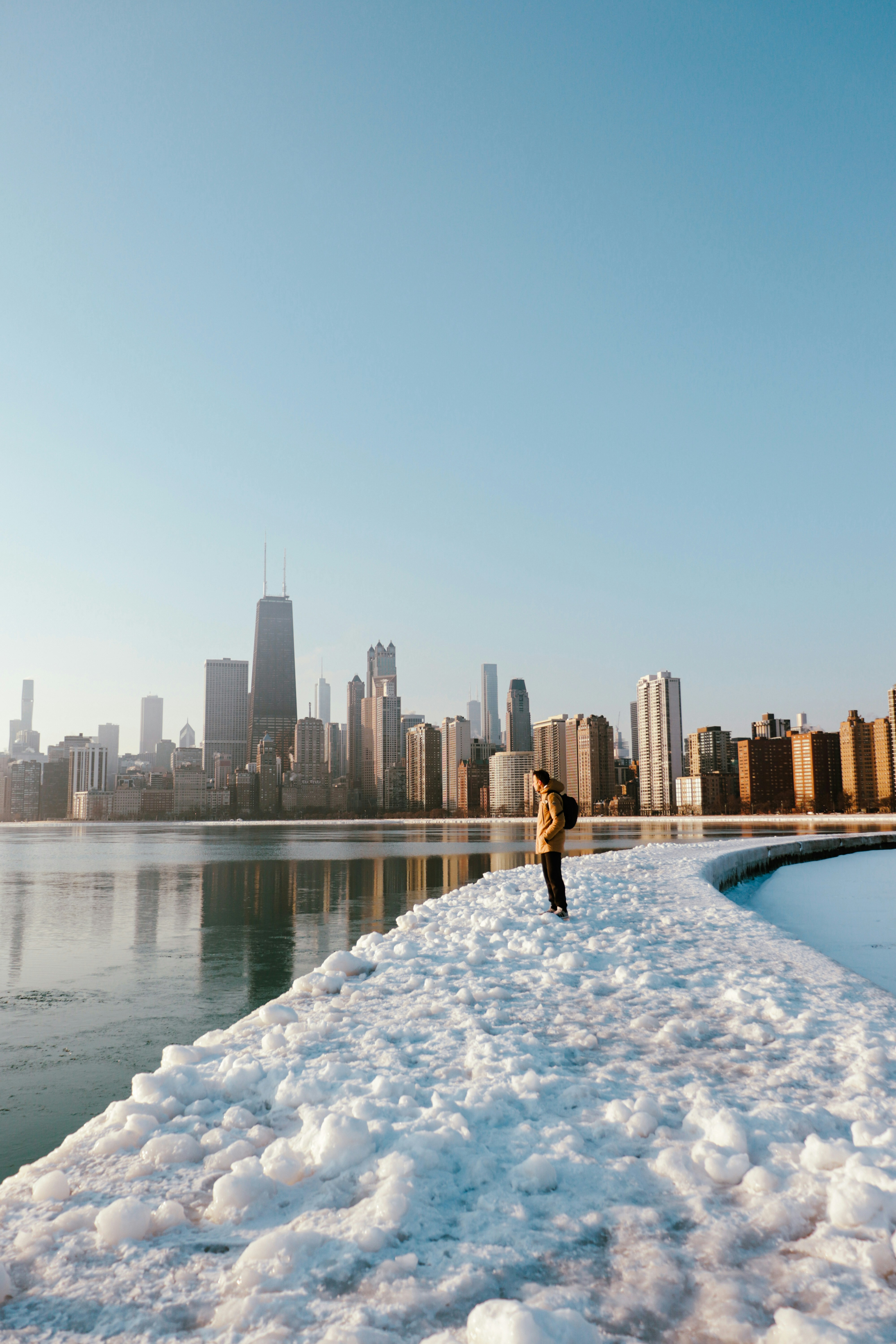Ice Causeway to a Snowlit Skyline