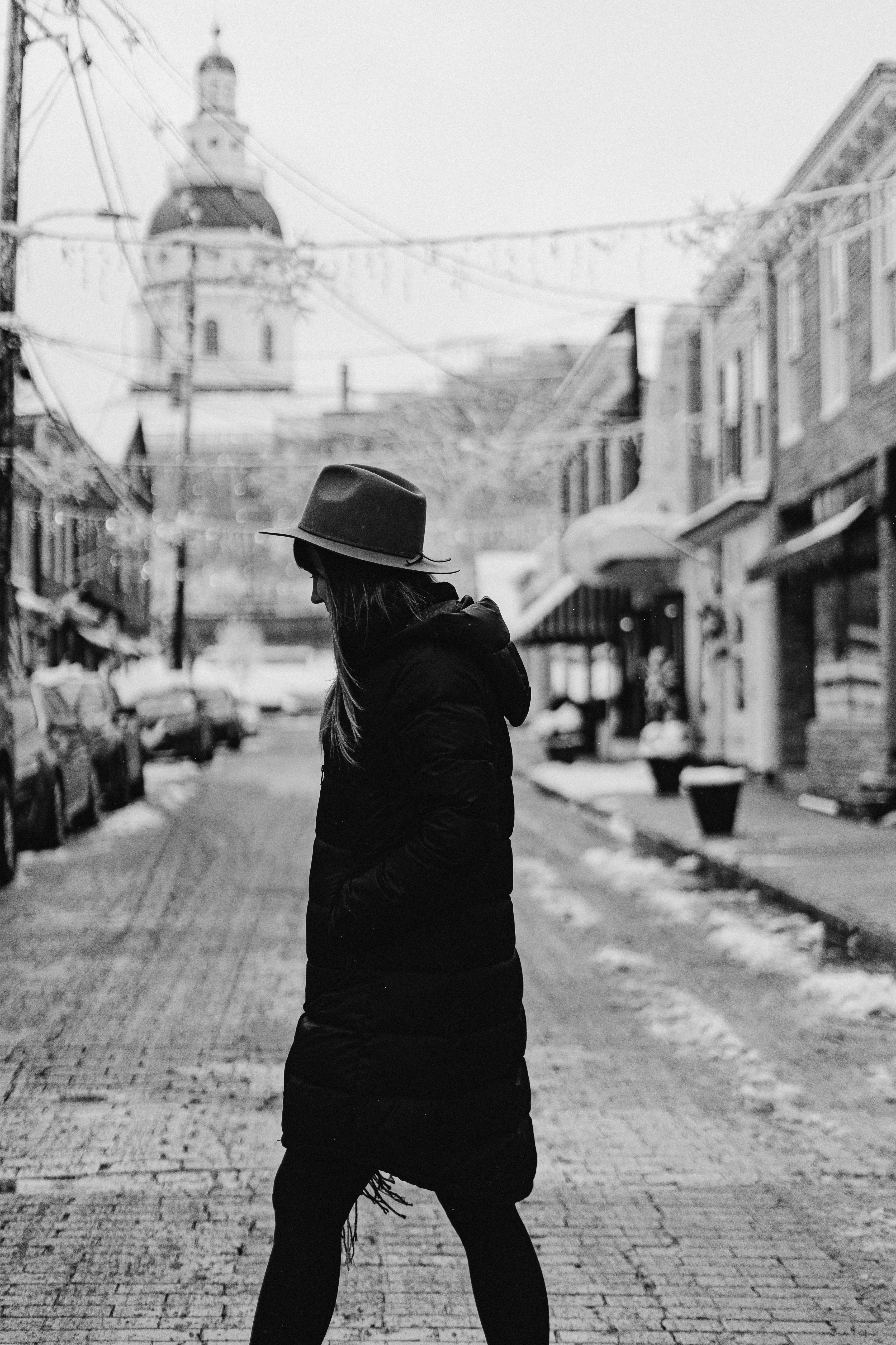 Midwinter Silhouette on a String-Lit Street