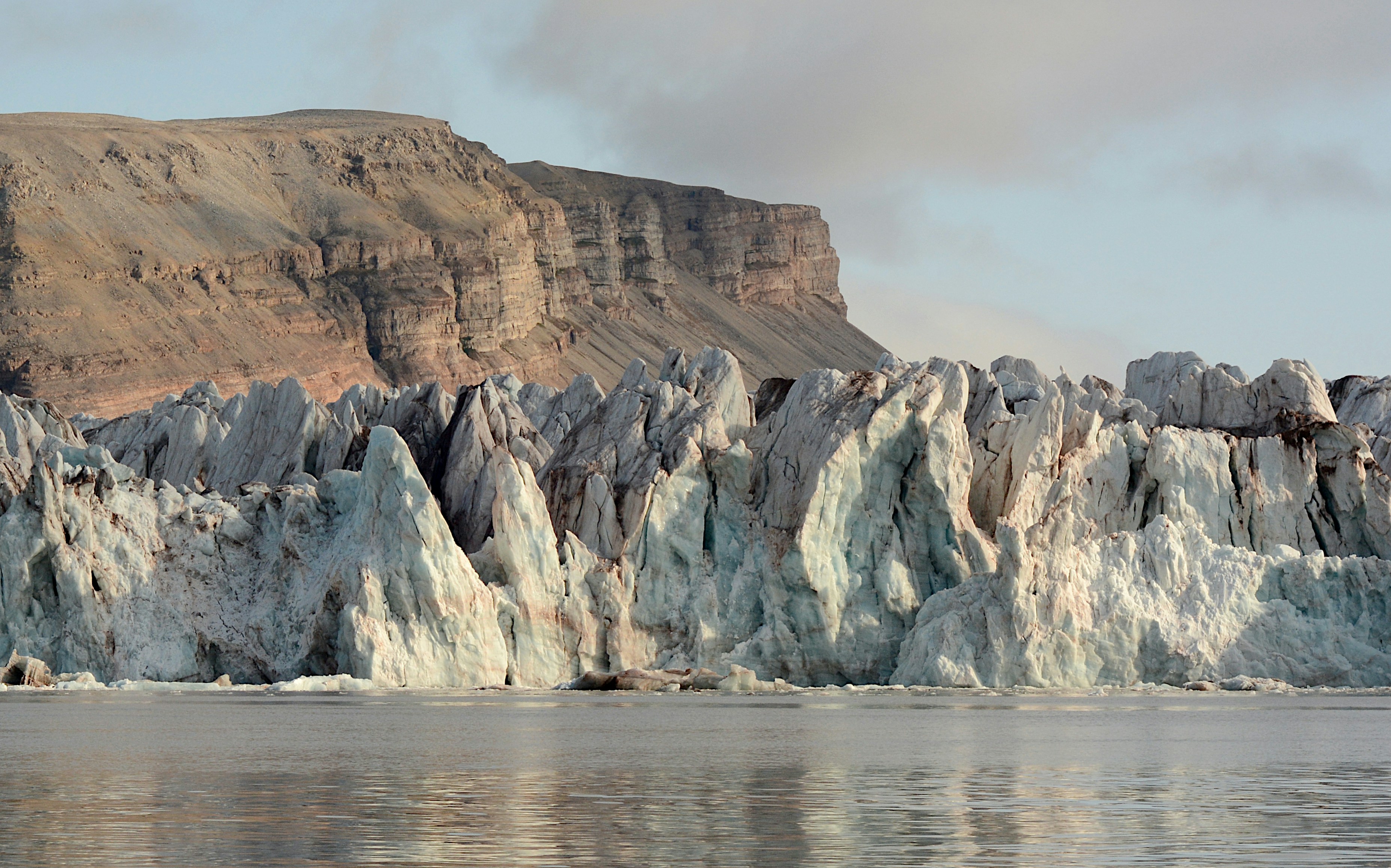 Icefront Echoes: Jagged Glaciers Meet Quiet Sea