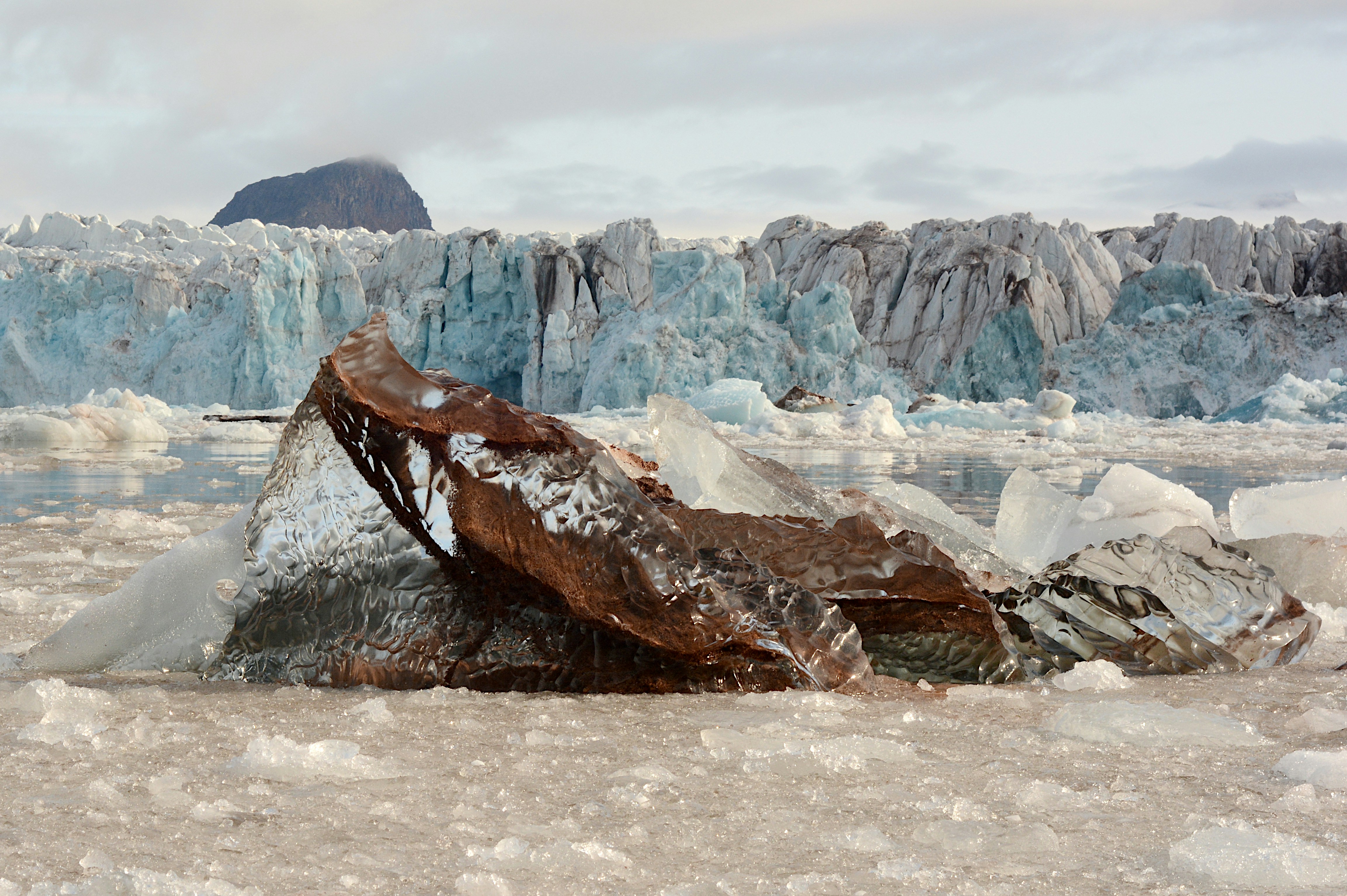 A large piece of metal sitting on top of ice photo – Free Svalbard ...
