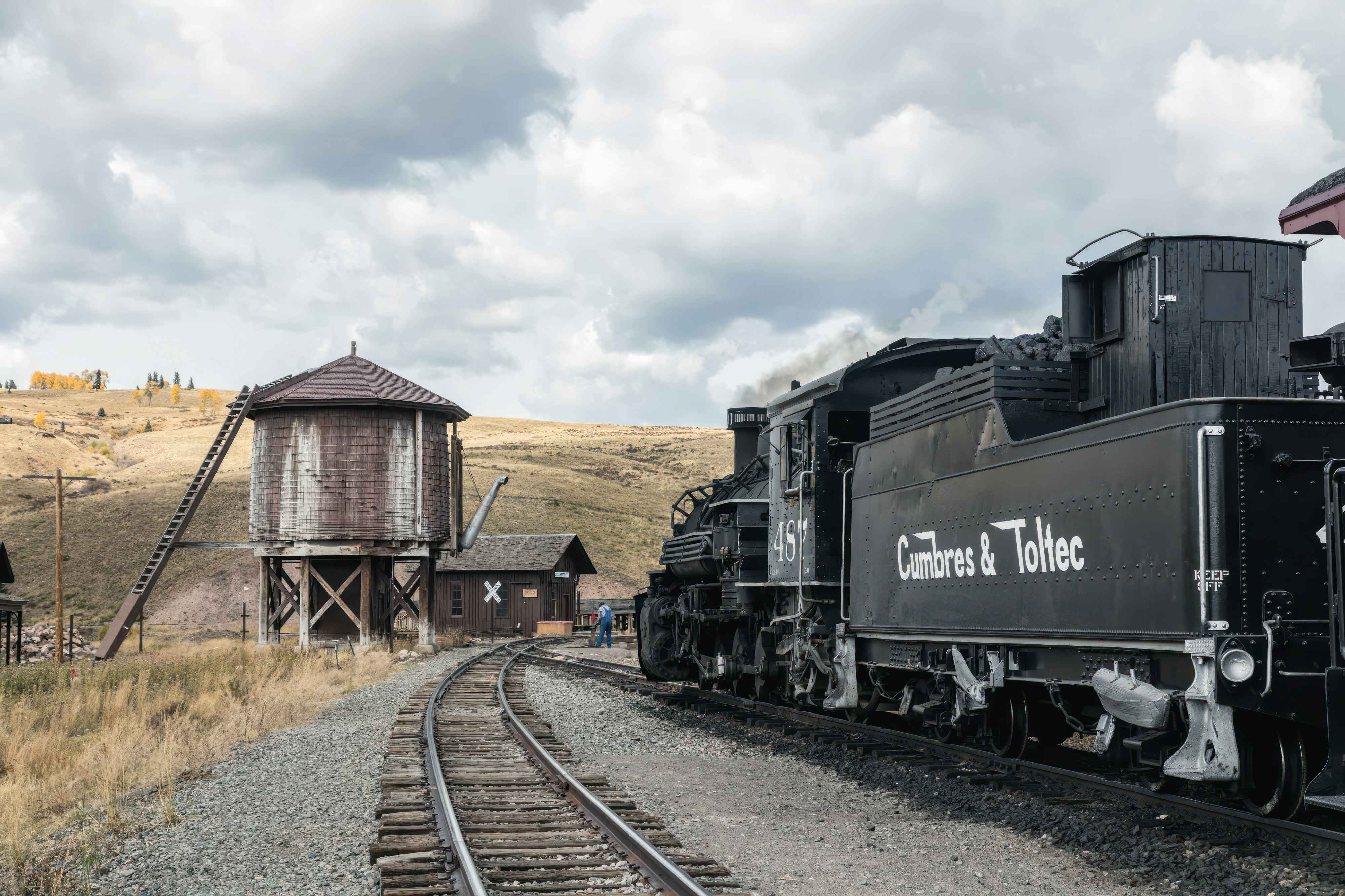 A water tower, the steam engine, and tender at tiny Osier, Colorado, on ...