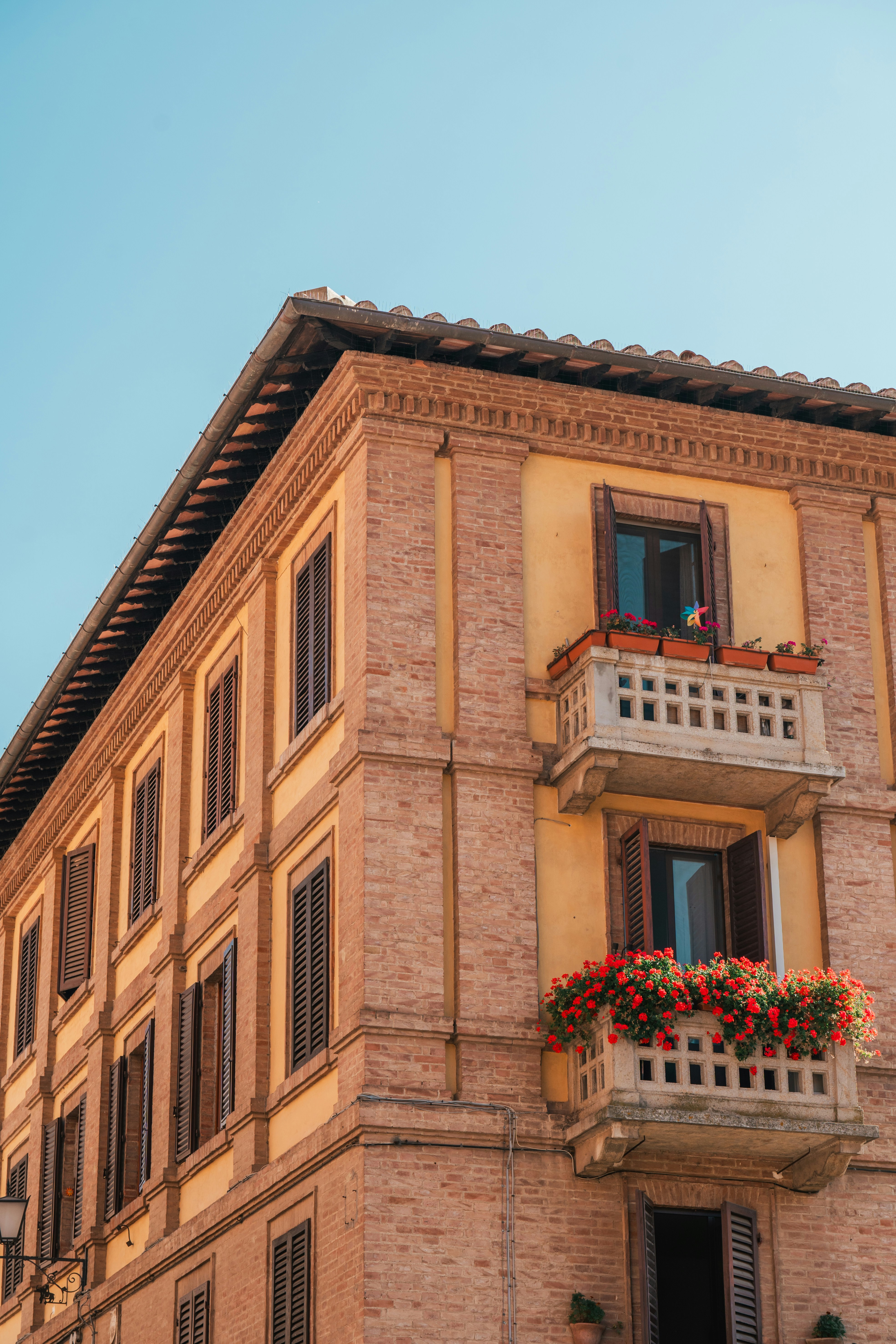 Old apartment building in Siena, Italy.