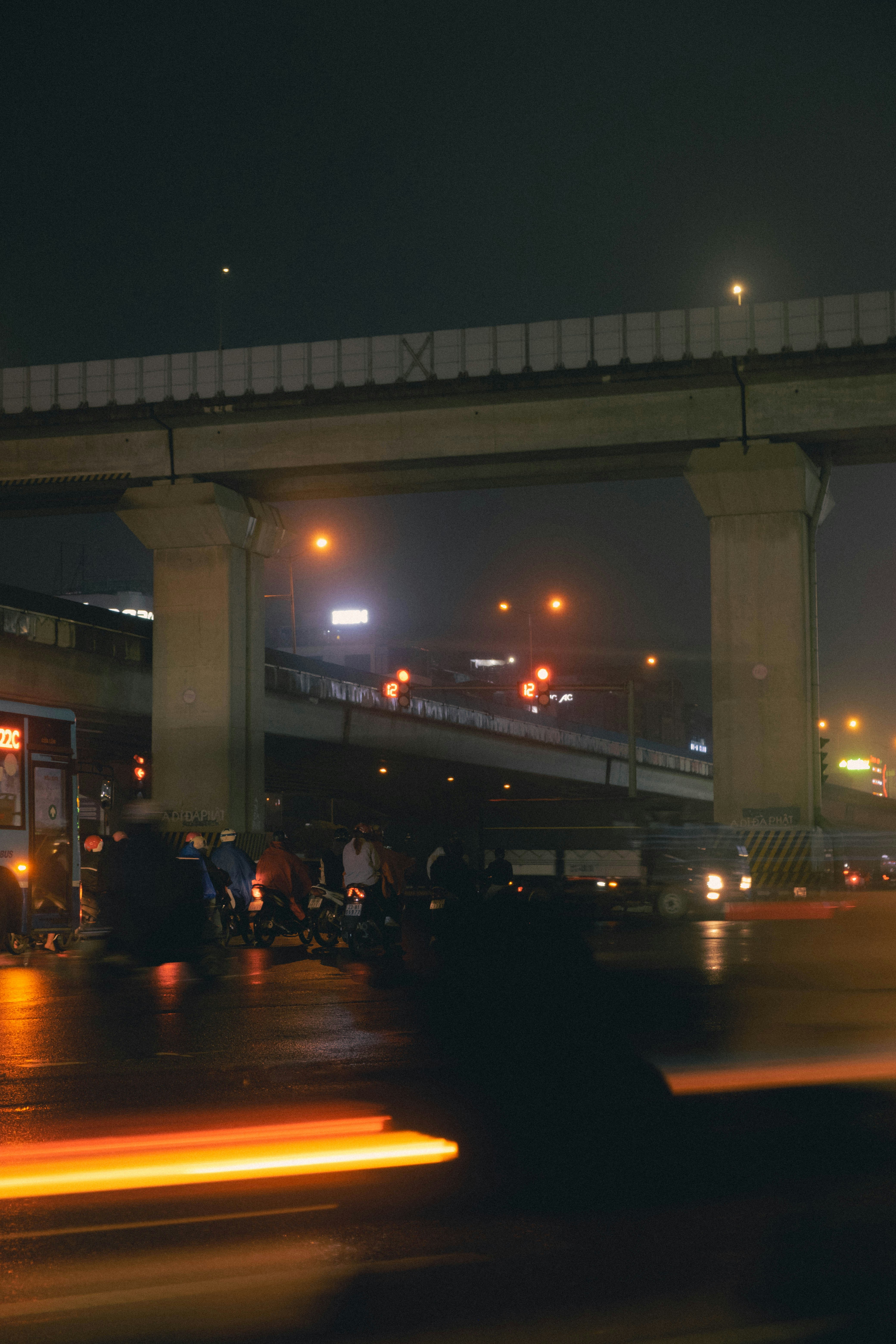 Underpass Night Market: Silhouettes and Light Trails
