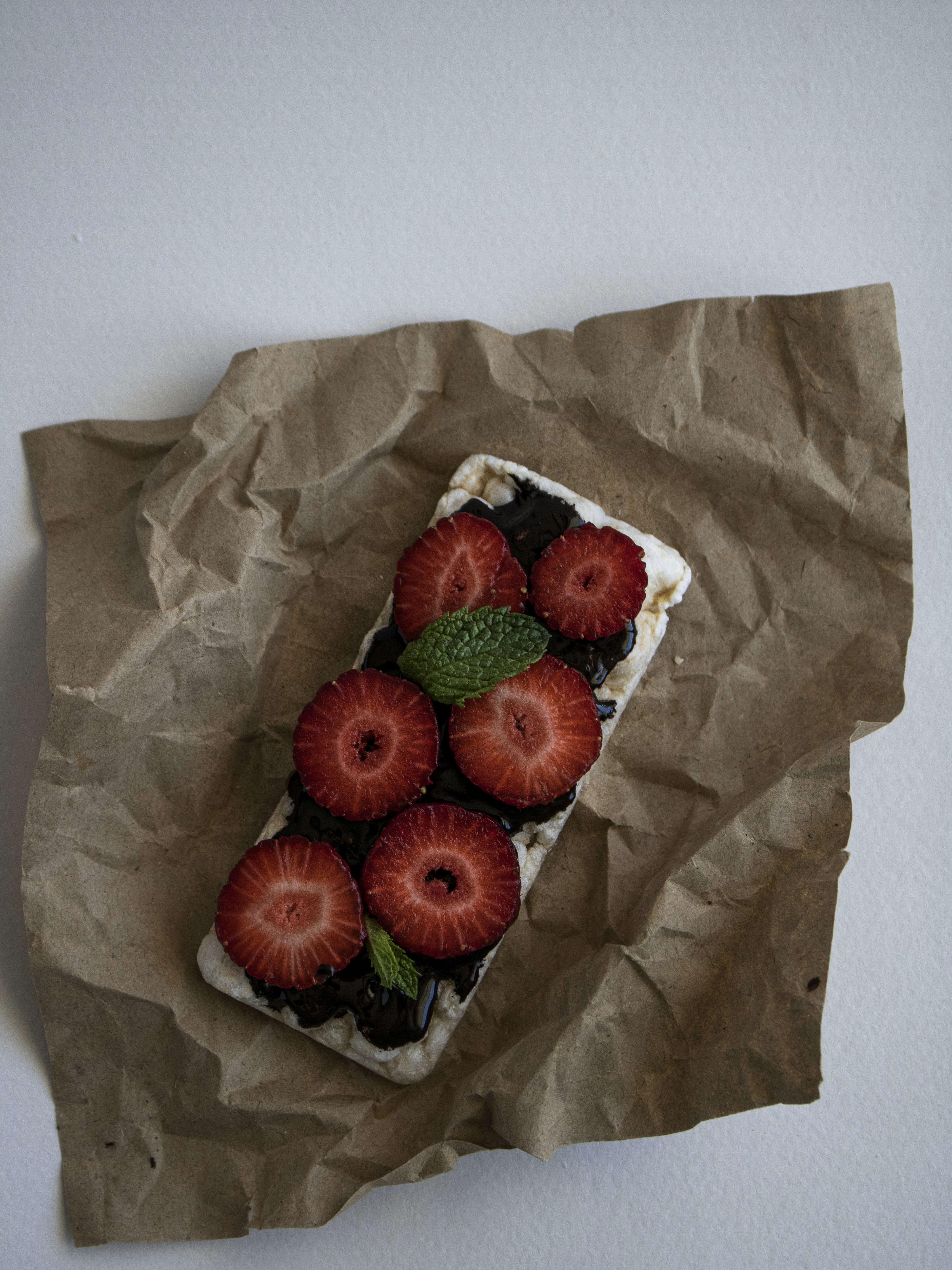 Berry Crest on Cream: A Rectangular Dessert on Crumpled Kraft