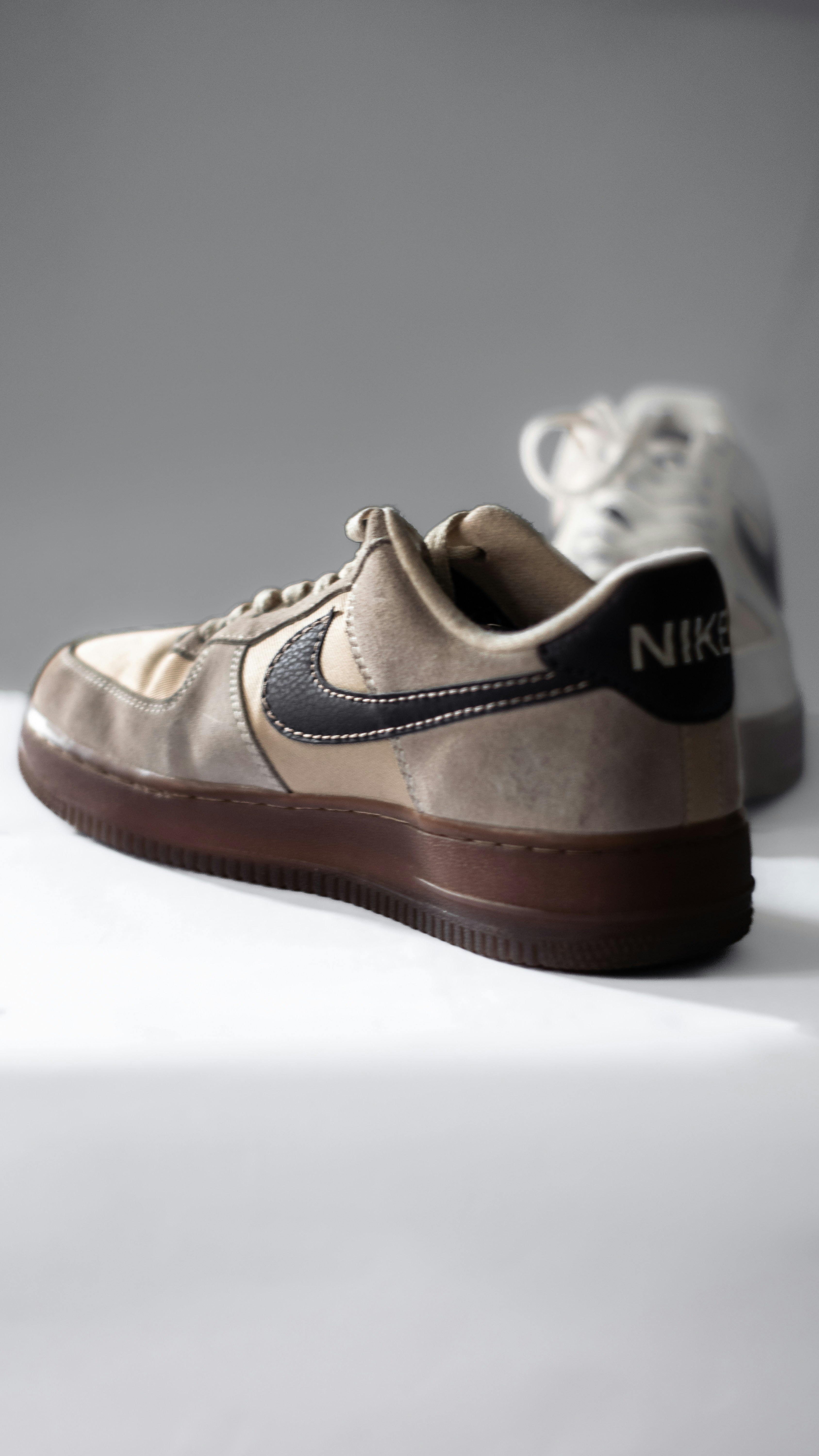 Beige Nike Sneaker in Focus: A Minimal Studio Shot