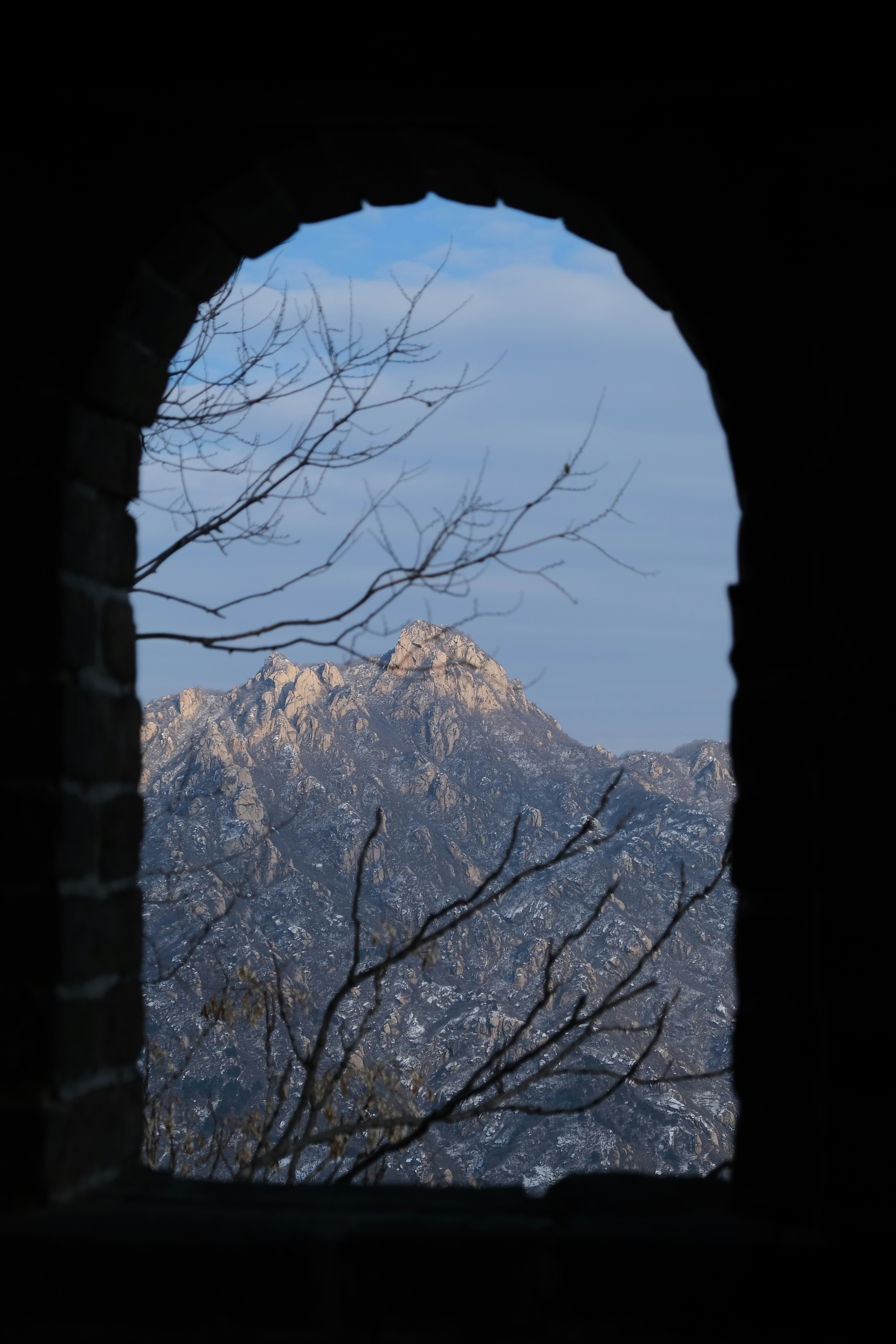 A view of a mountain through a window photo – Free China Image on Unsplash
