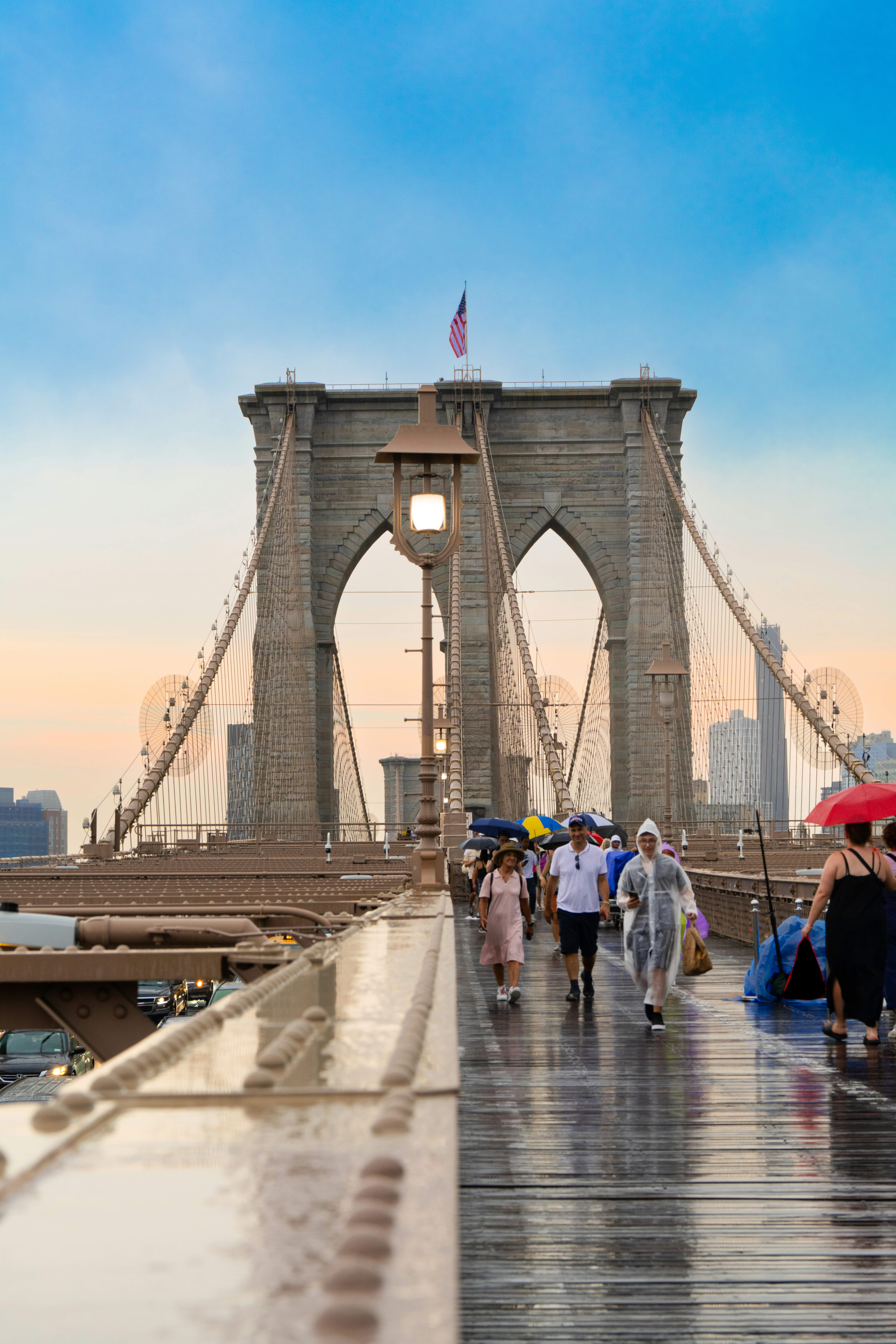 A group of people walking across a bridge photo – Free New york Image ...
