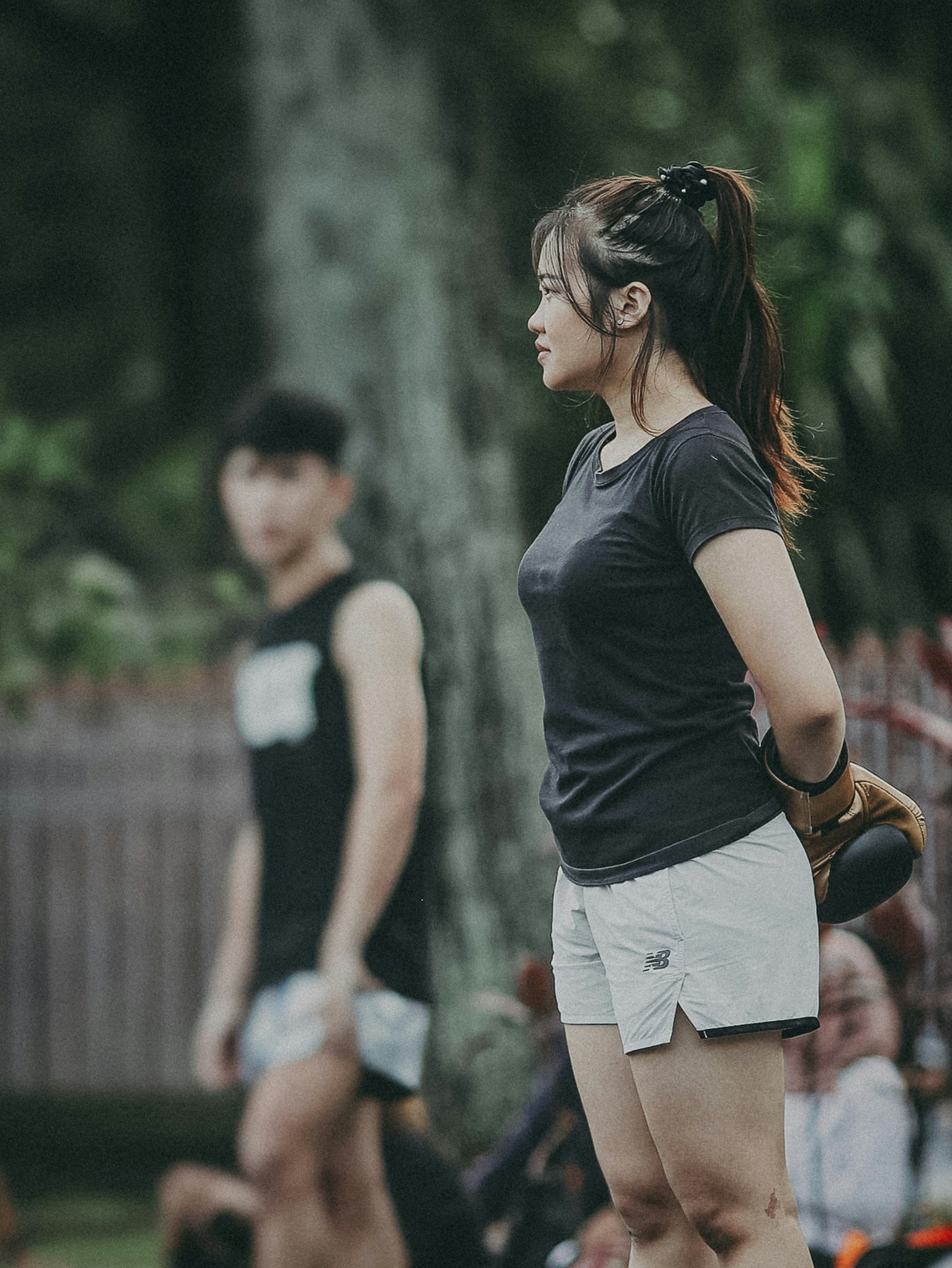 A couple of people standing next to each other photo – Free Woman Image ...